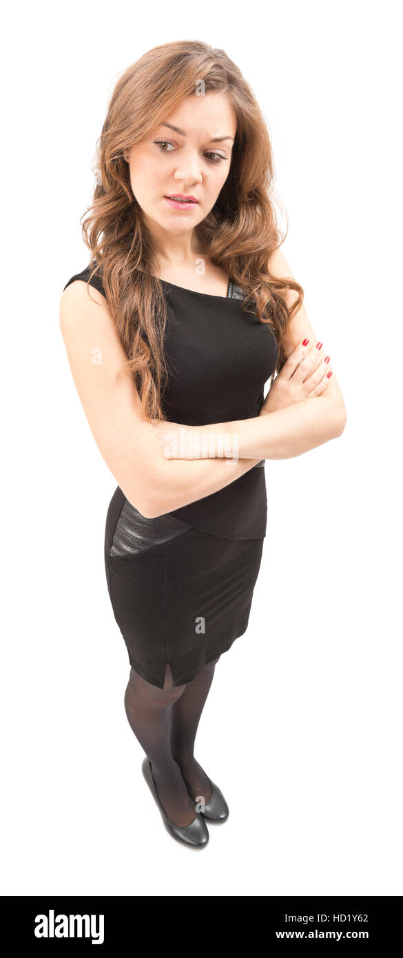 Young woman looking unsure Stock Photo - Alamy