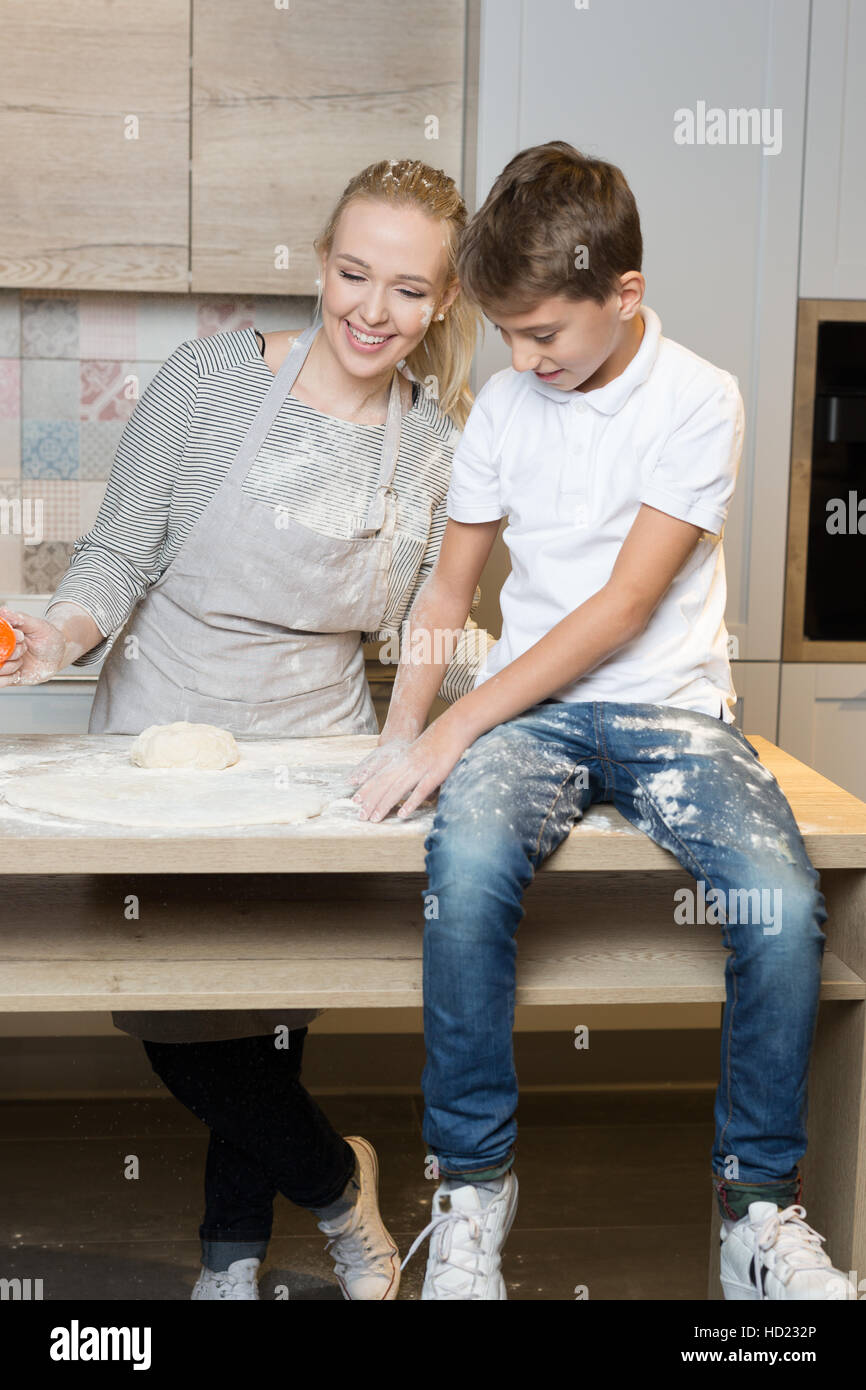 Mother and son baking together at home Stock Photo - Alamy
