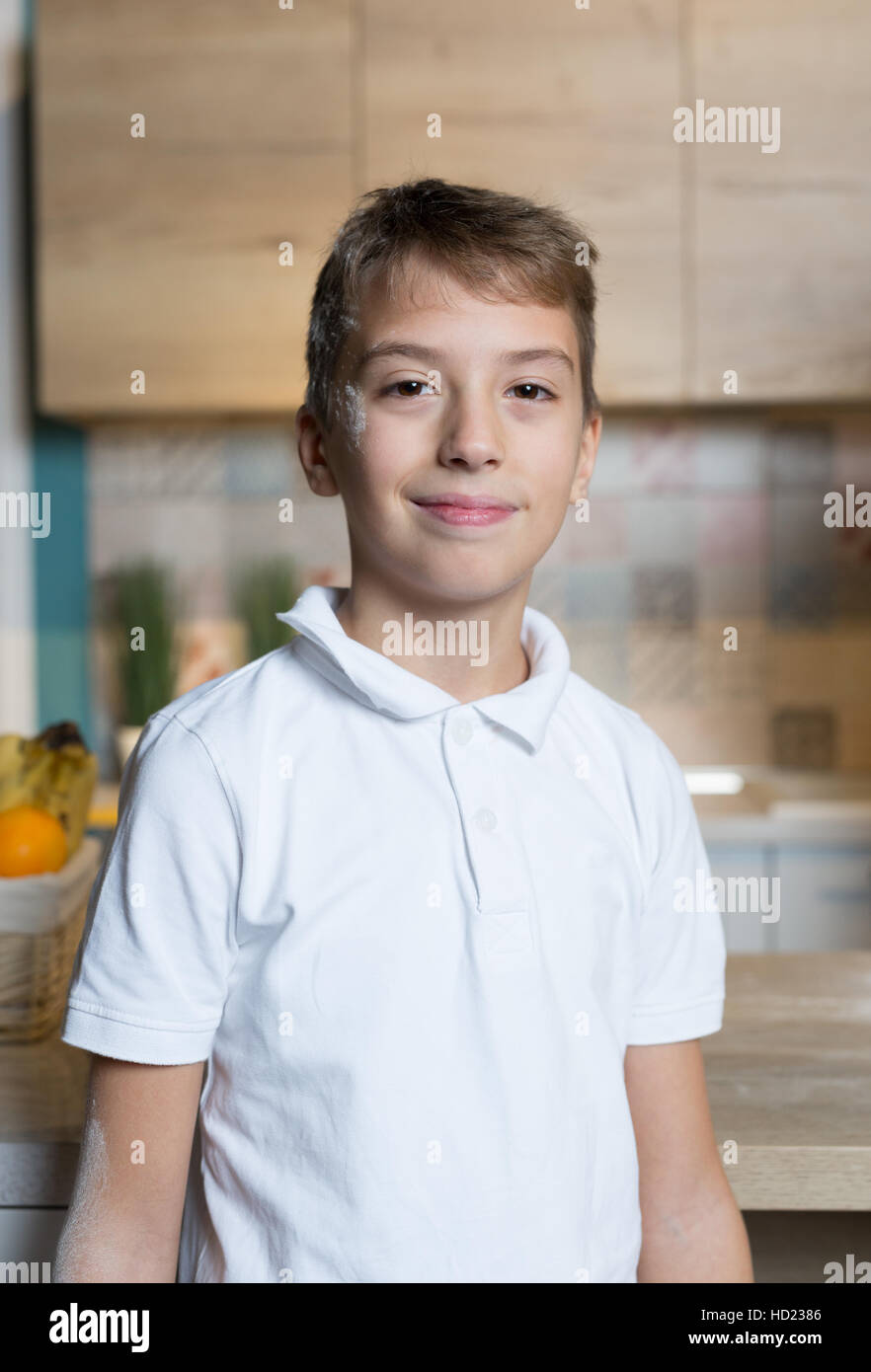 Cute adorable little boy in the kitchen Stock Photo - Alamy