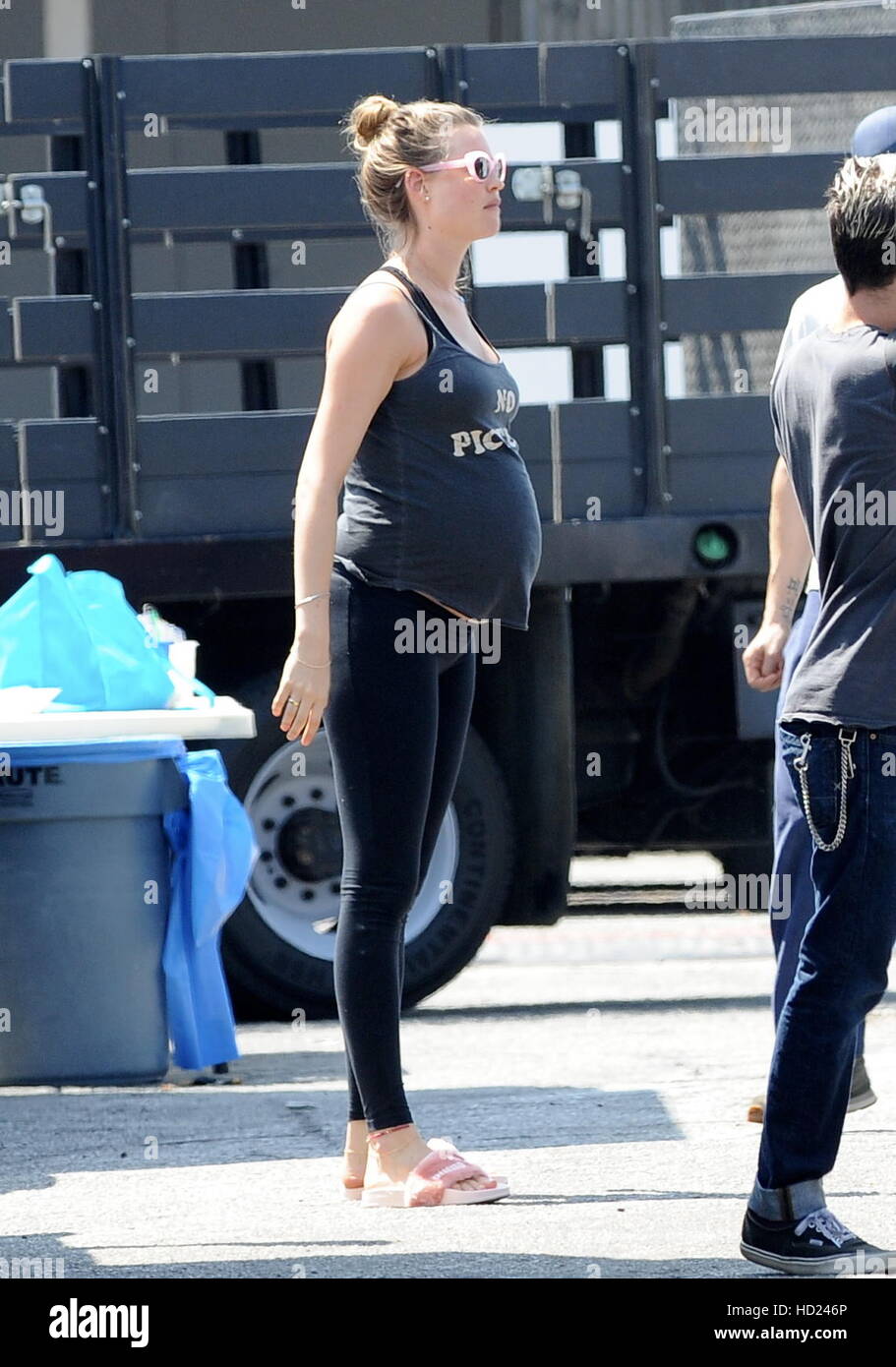 Pregnant Behati Prinsloo visits husband Adam Levine on the set of his ...