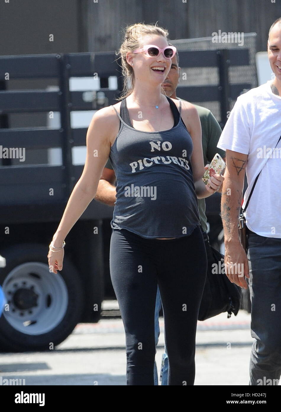 Pregnant Behati Prinsloo visits husband Adam Levine on the set of his ...