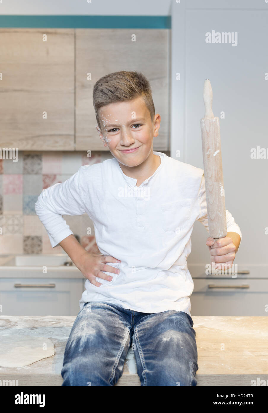 Cute adorable little boy in the kitchen Stock Photo - Alamy