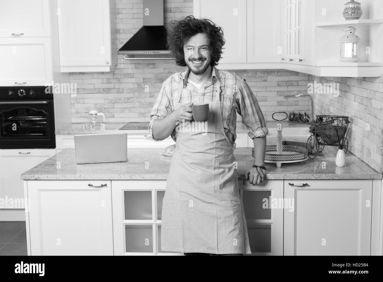 Guy in apron Black and White Stock Photos & Images - Alamy