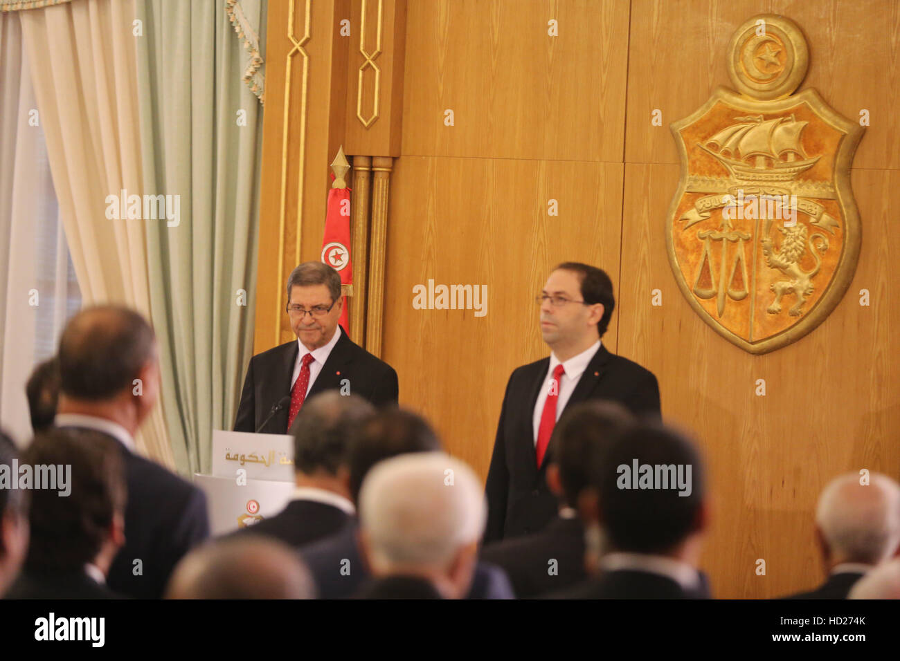 Tunisia's Prime Minister Youssef Chahed (r) with Habib Essid during the ...