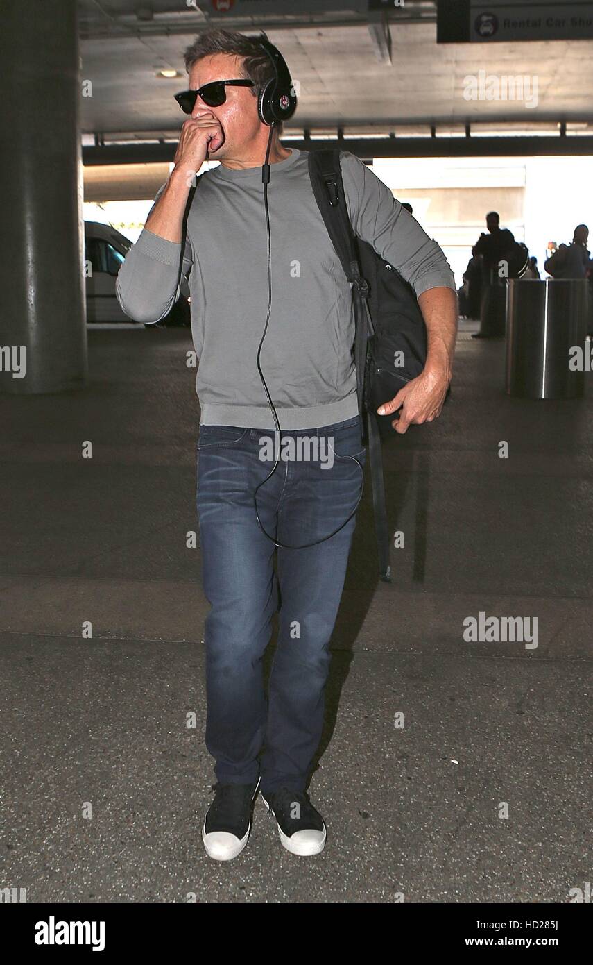 Jeremy Renner arrives at Los Angeles International (LAX) Airport ...