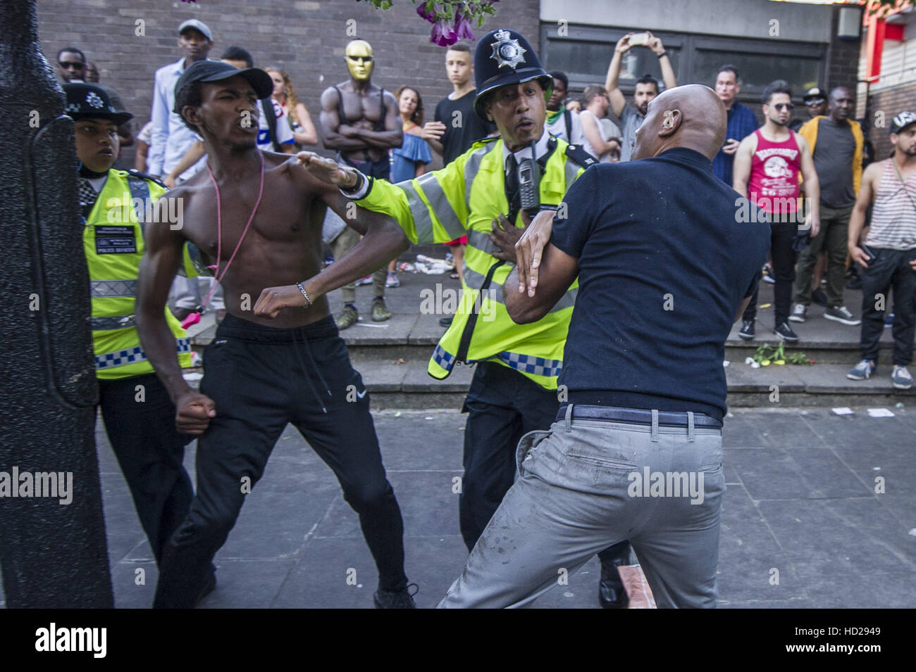 A fight breaks out at the annual Notting Hill Carnival in London ...