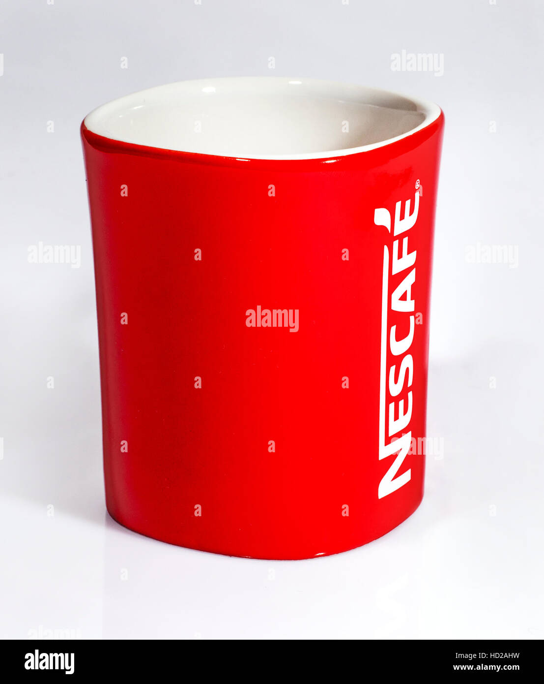 Nescafe mug, red mug Stock Photo - Alamy