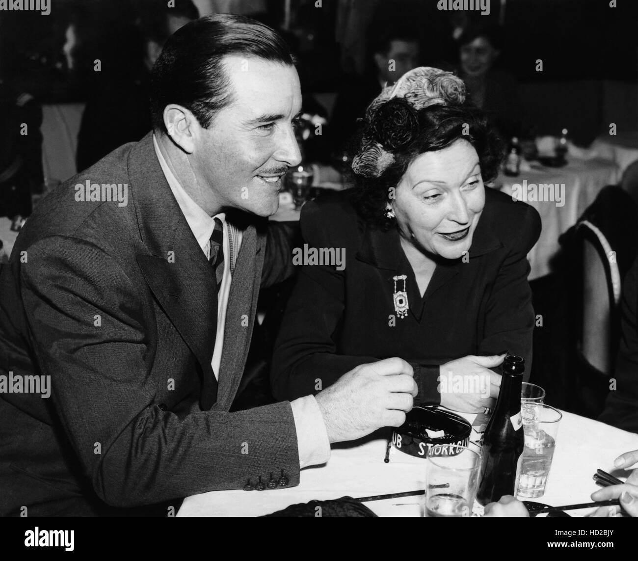 John Boles and his wife, Marielite, at The Stork Club, 1944 Stock Photo ...
