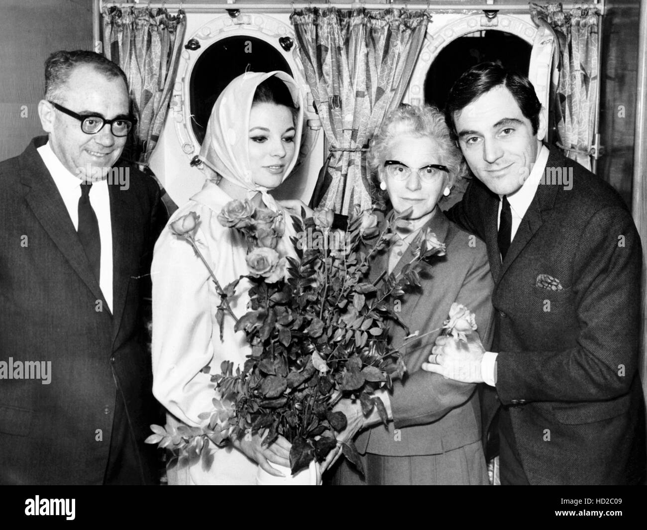 Newleyweds Joan Collins, in scarf, and Anthony Newley, right, with ...