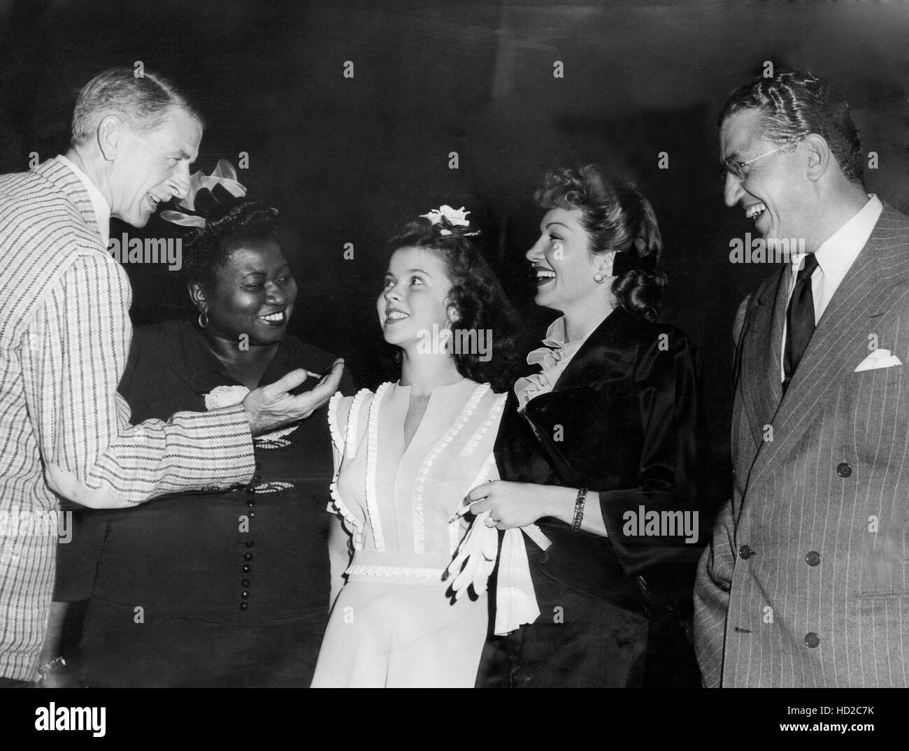 Director John Cromwell, Hattie McDaniel, Claudette Colbert, producer ...