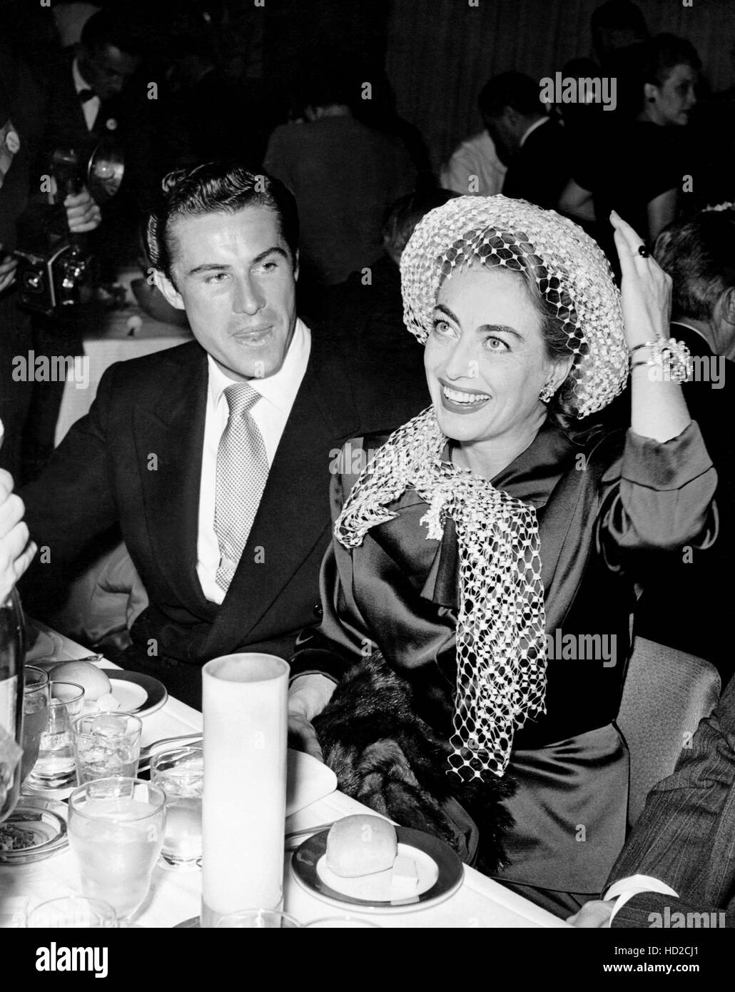 Joan Crawford, right, with her date, actor Peter Shaw, at the Look ...