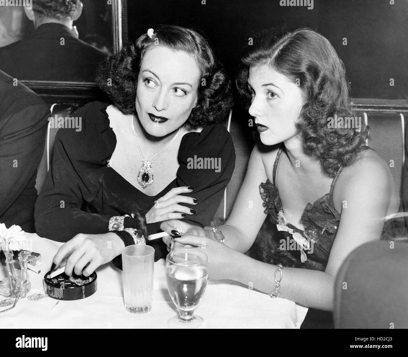 Joan Crawford, left, and socialite Brenda Frazier, at the Stork Club ...