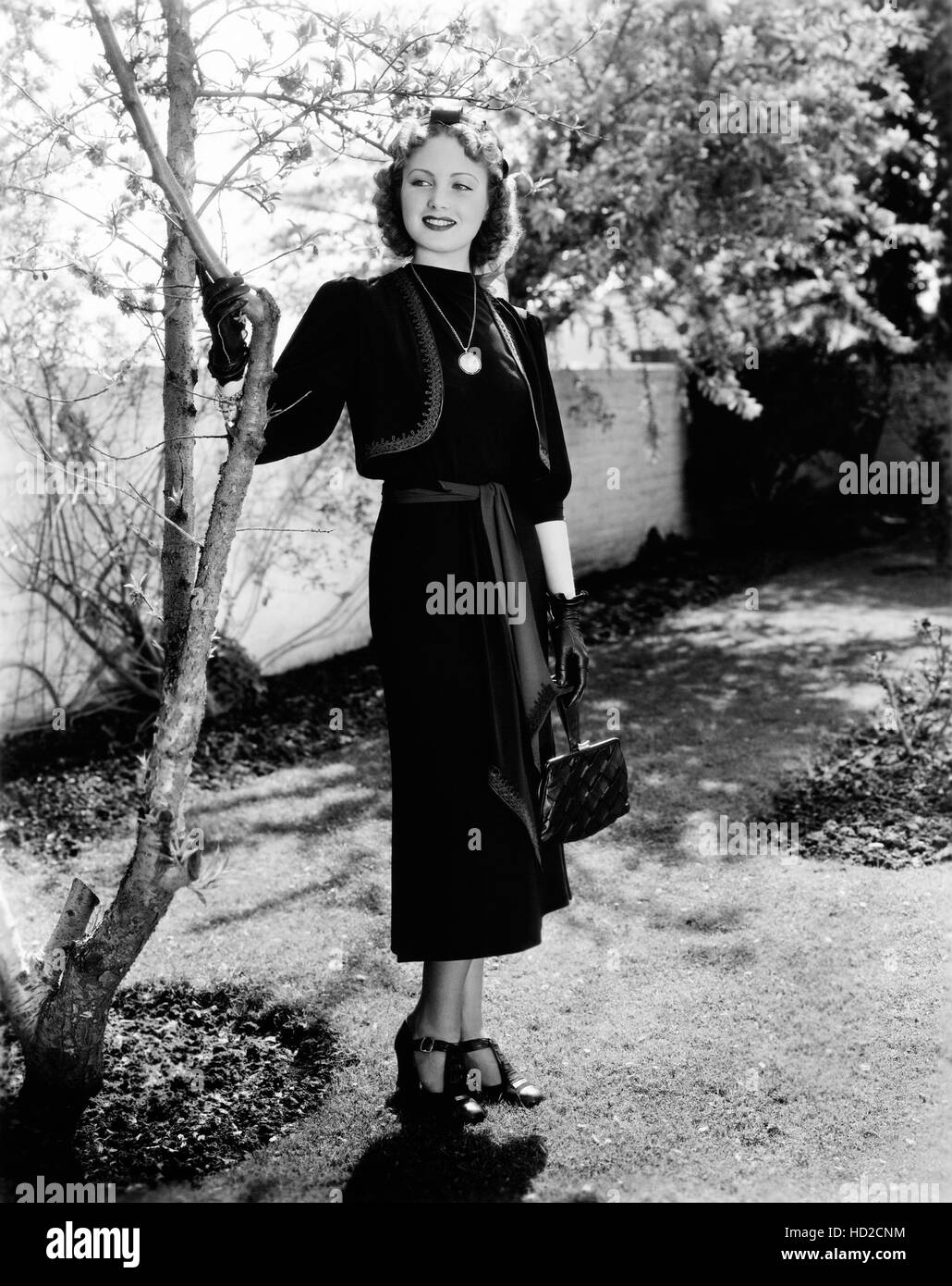 June Lang wears a navy blue dress with bolero jacket, 1937. ©20th ...