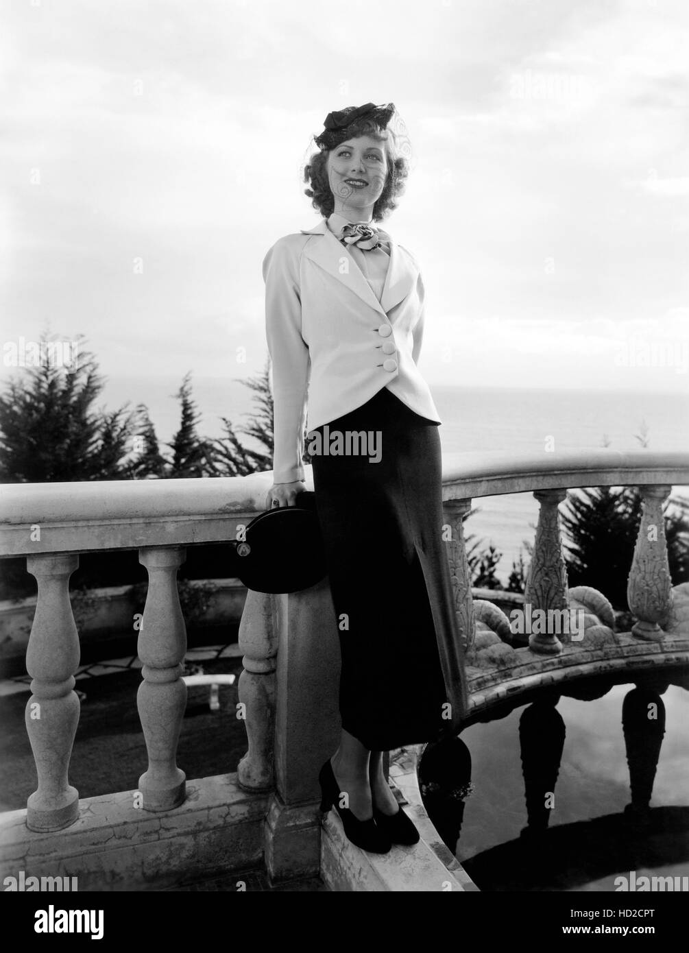 June Lang wearing a pink and black bengaline suit, 1936. ©20th Century ...