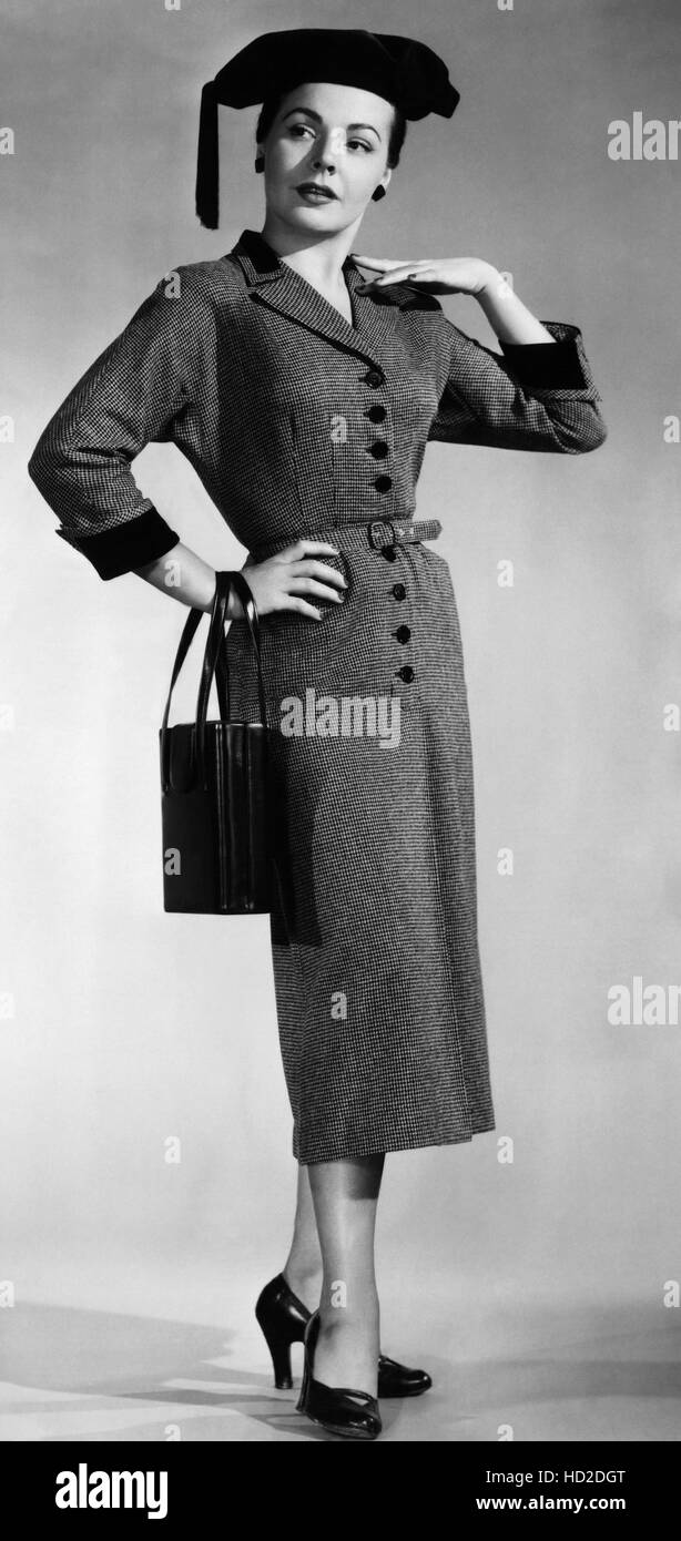 Kasey Rogers, (aka Laura Elliot), modeling a wool dress by McKettrick ...