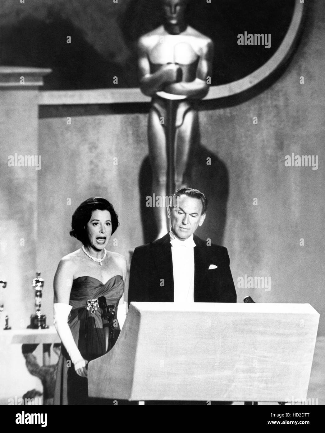 From left: Kitty Carlisle, Moss Hart presenting the Best Screenplay Award at the Academy Awards ...