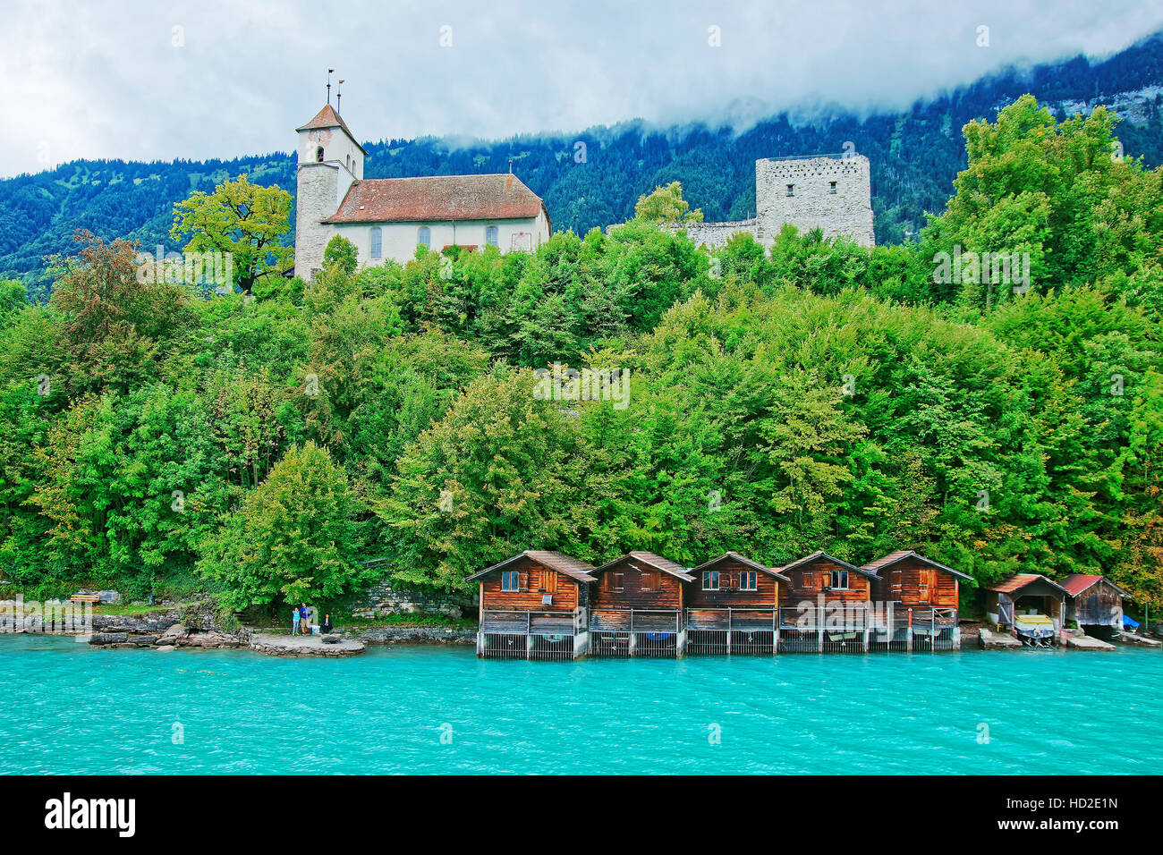 Parish Church at Lake Brienz and Brienzer Rothorn mountain at ...
