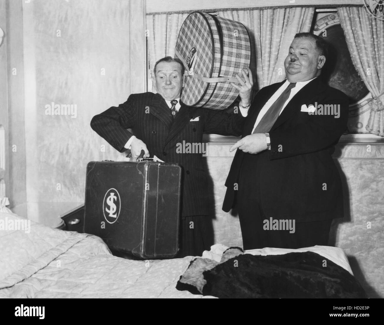 From left: Stan Laurel, Oliver Hardy aboard the Queen Elizabeth on ...