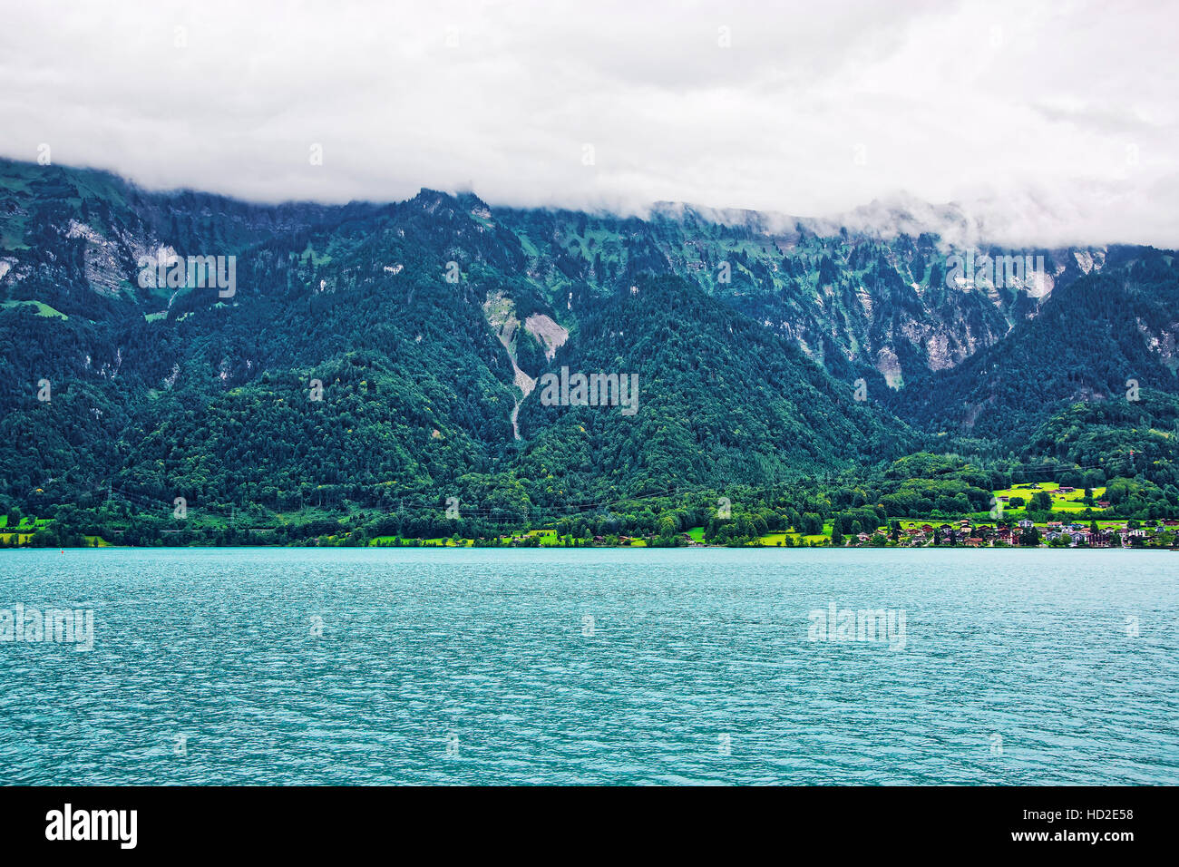 Panorama on Brienz Lake and Brienzer Rothorn mountain with traditional ...