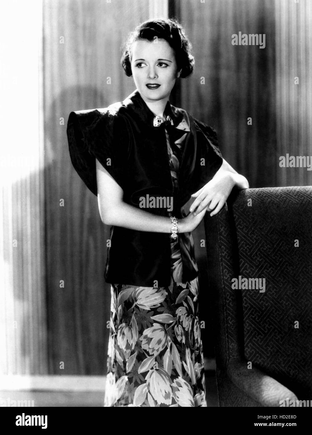 Mary Astor, modeling a purple taffeta jacket, 1935 Stock Photo - Alamy