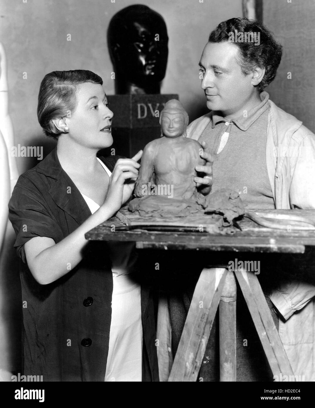 From left: Mary Boland receiving sculpting lessons from S. Carpino ...