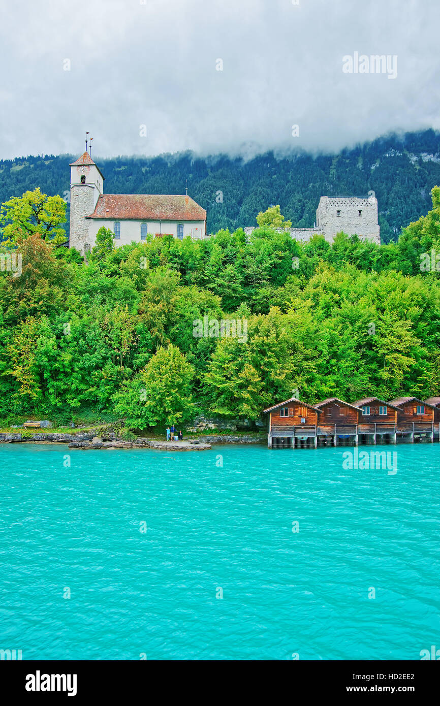 Parish Church at Brienz Lake and Brienzer Rothorn mountain at ...
