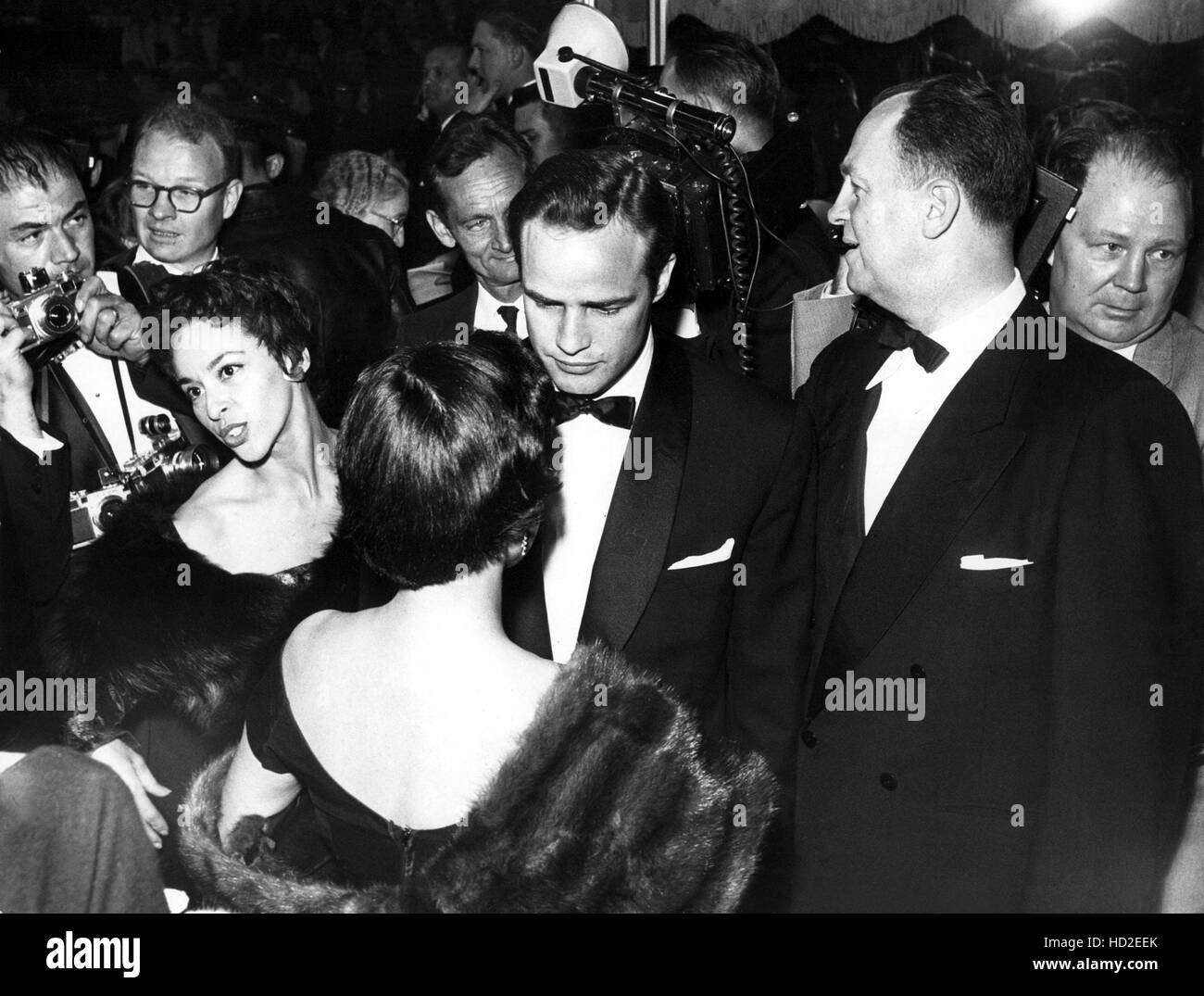 Marlon Brando and his secretary Celia Meredith arriving at the Academy ...