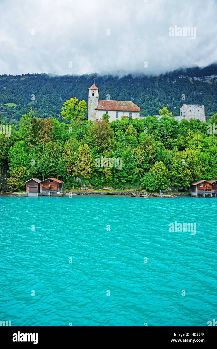 Parish Church in Brienz Lake and Brienzer Rothorn mountain at ...