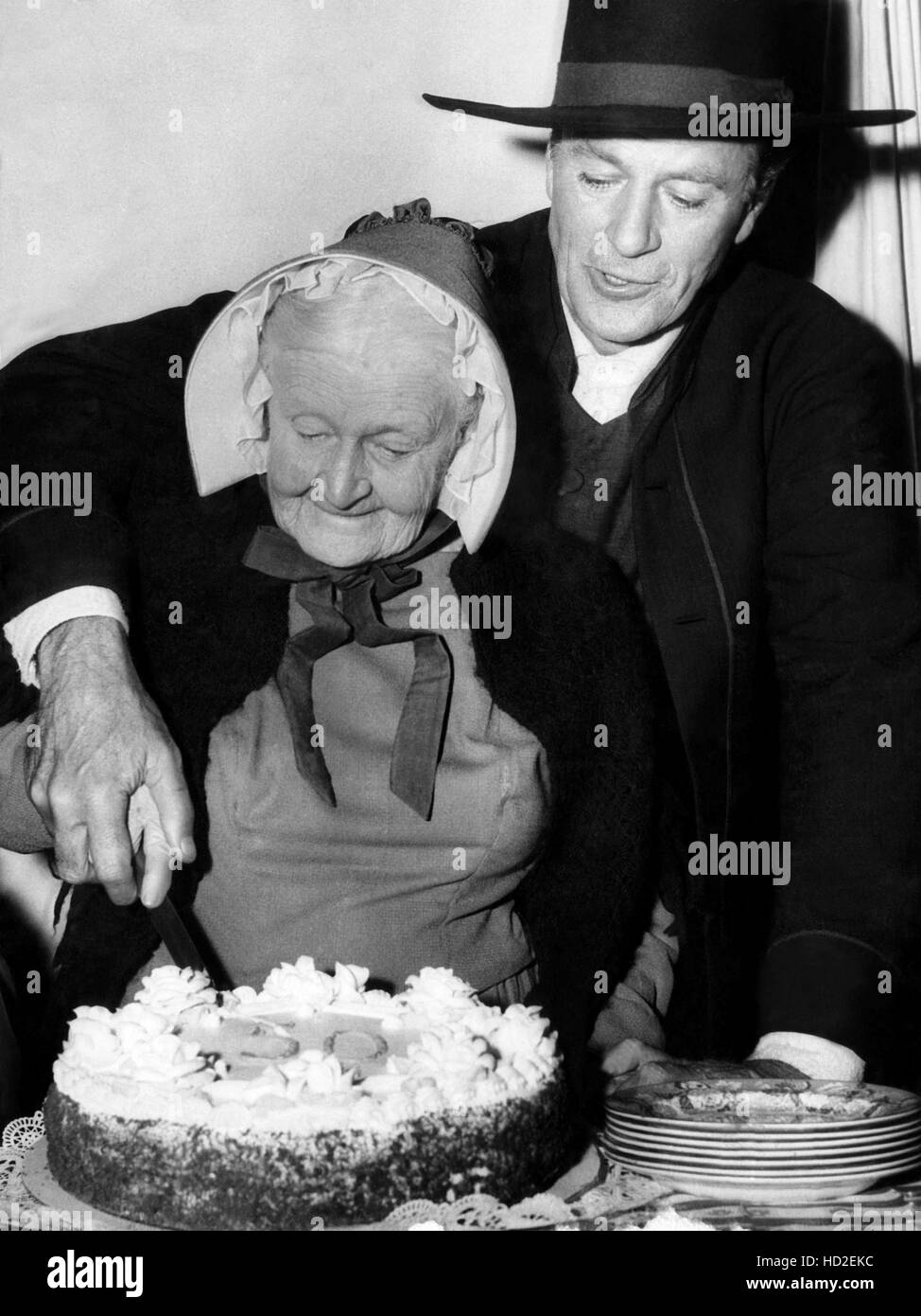 Gary Cooper helps Mary Carr celebrate her fiftieth anniversary in ...