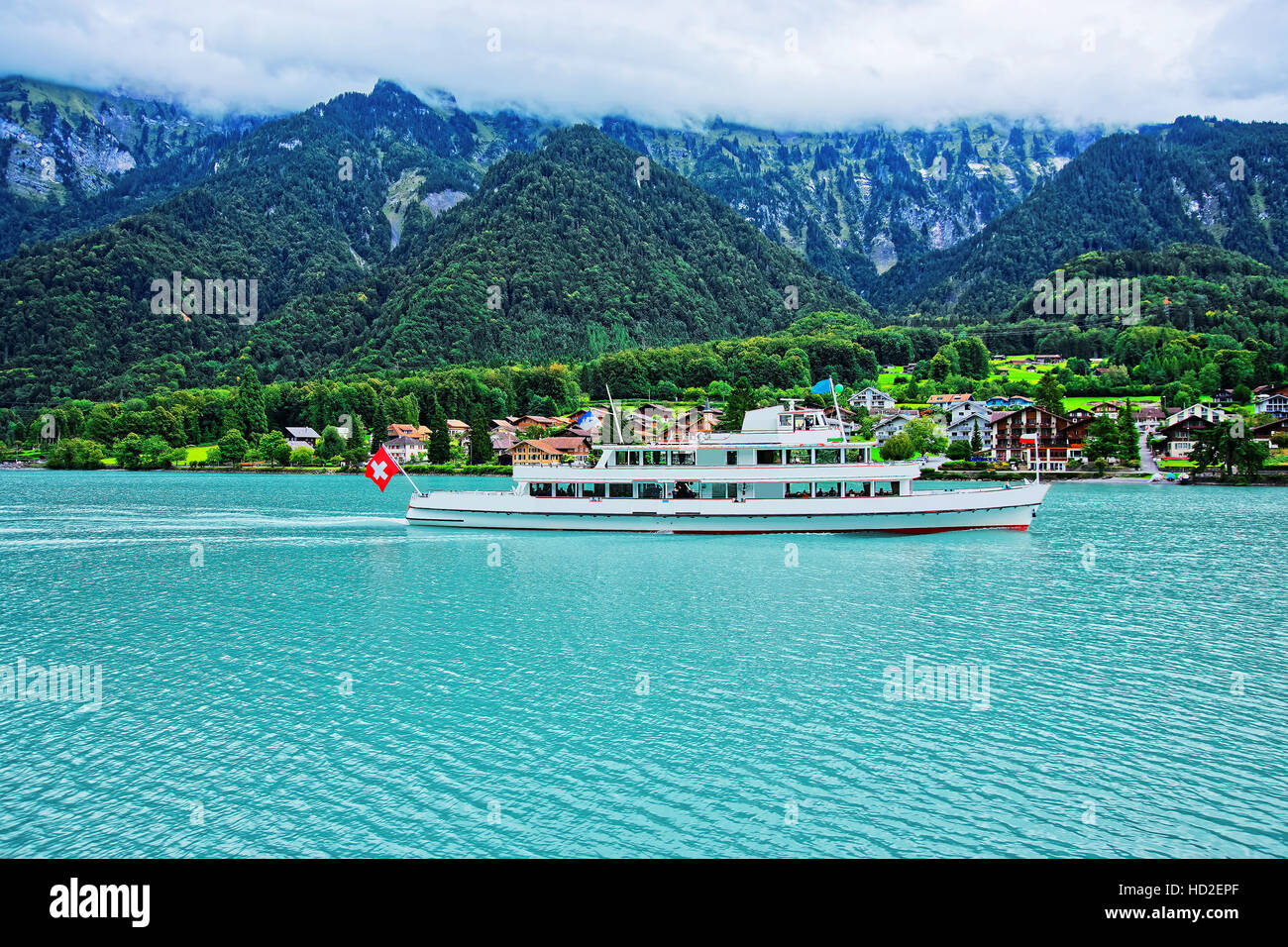 Passenger ferry on Lake Brienz and Brienzer Rothorn mountain at ...