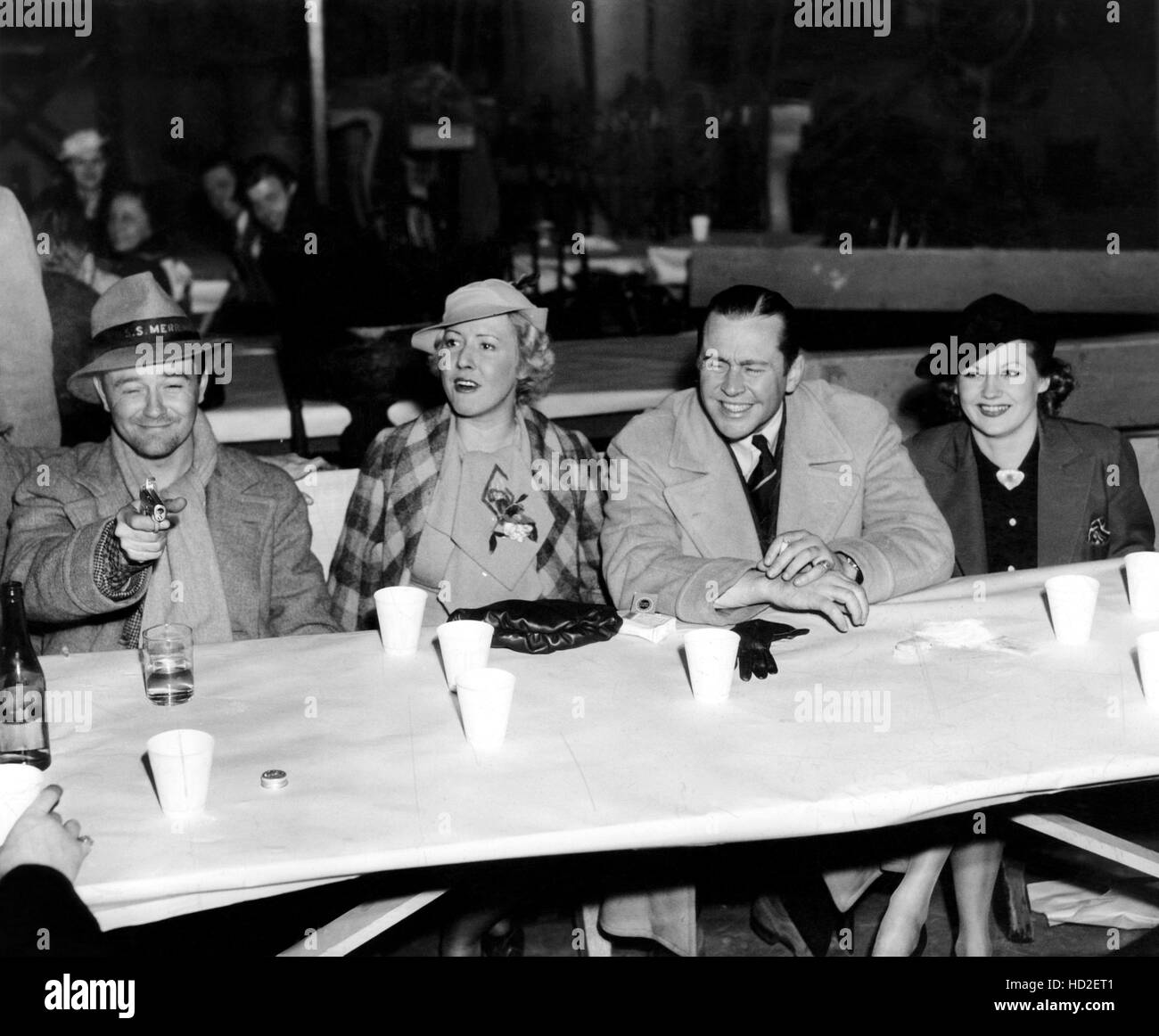 From left: Lew Ayres, Mae Clarke, James Dunn, Patsy Lee at studio party ...