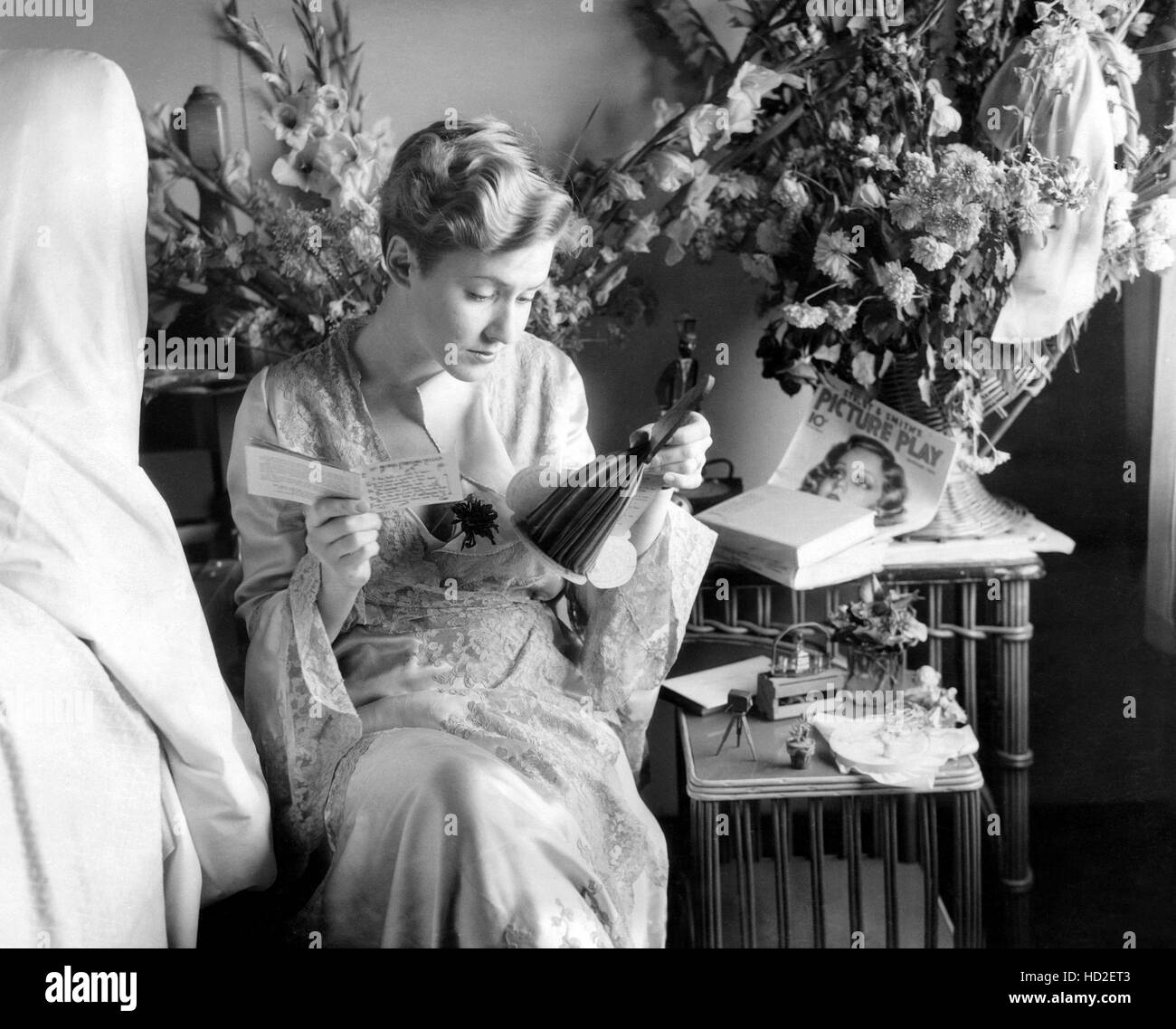 Mae Clarke reading get well card at Cedars of Lebanon Hospital where ...