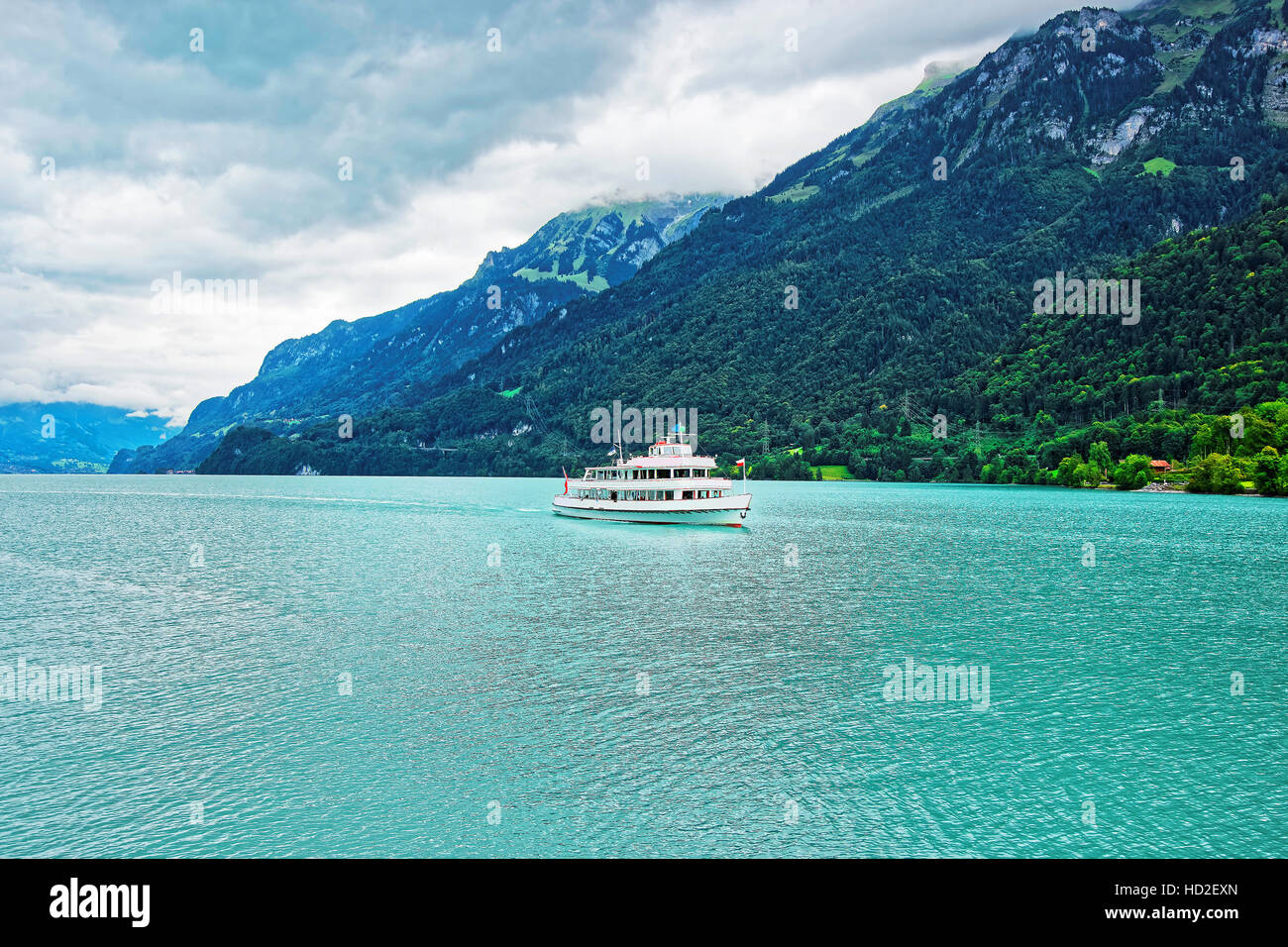 Passenger ferry at Lake Brienz and Brienzer Rothorn mountain at ...