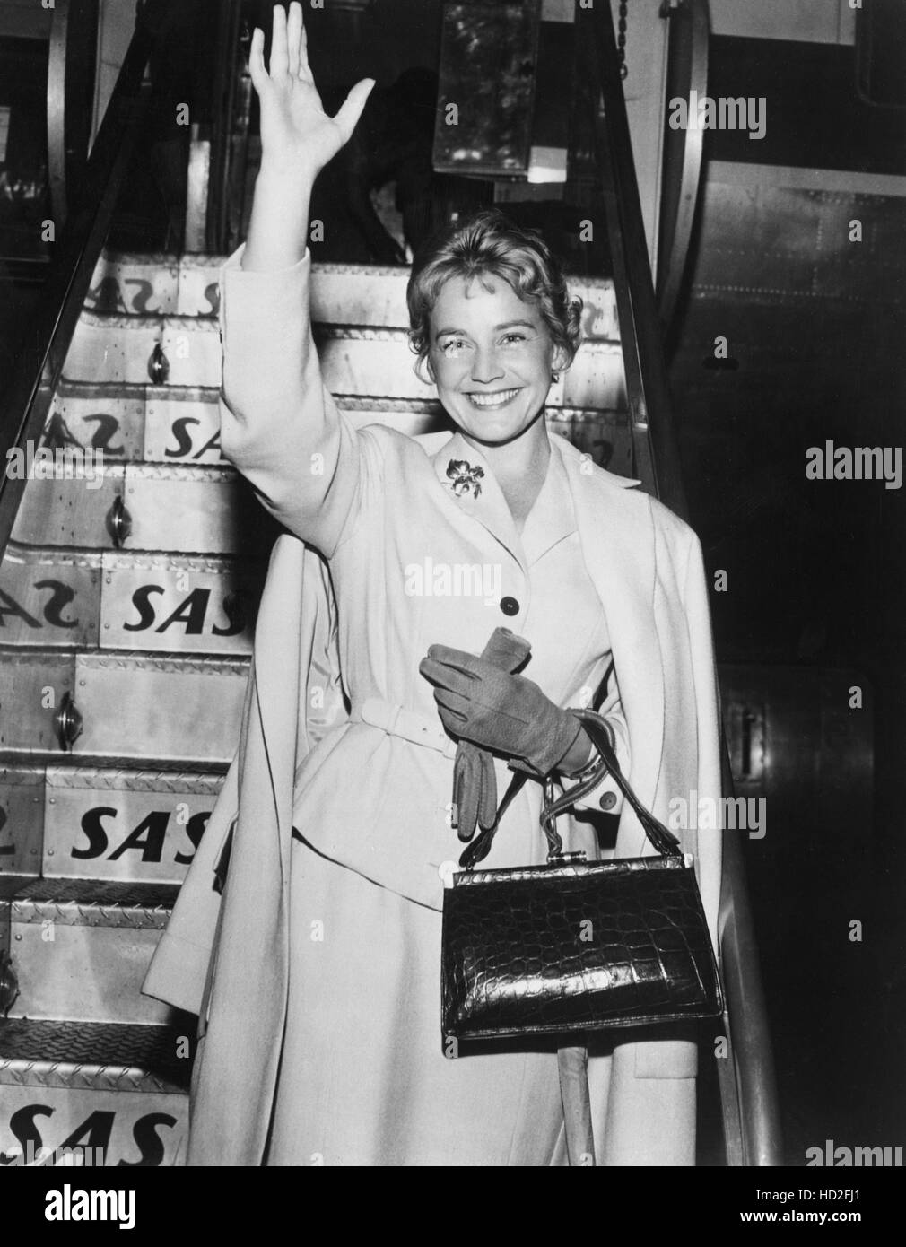 Maria Schell arrives in Hollywood, CA from Copenhagen, 1957 Stock Photo ...