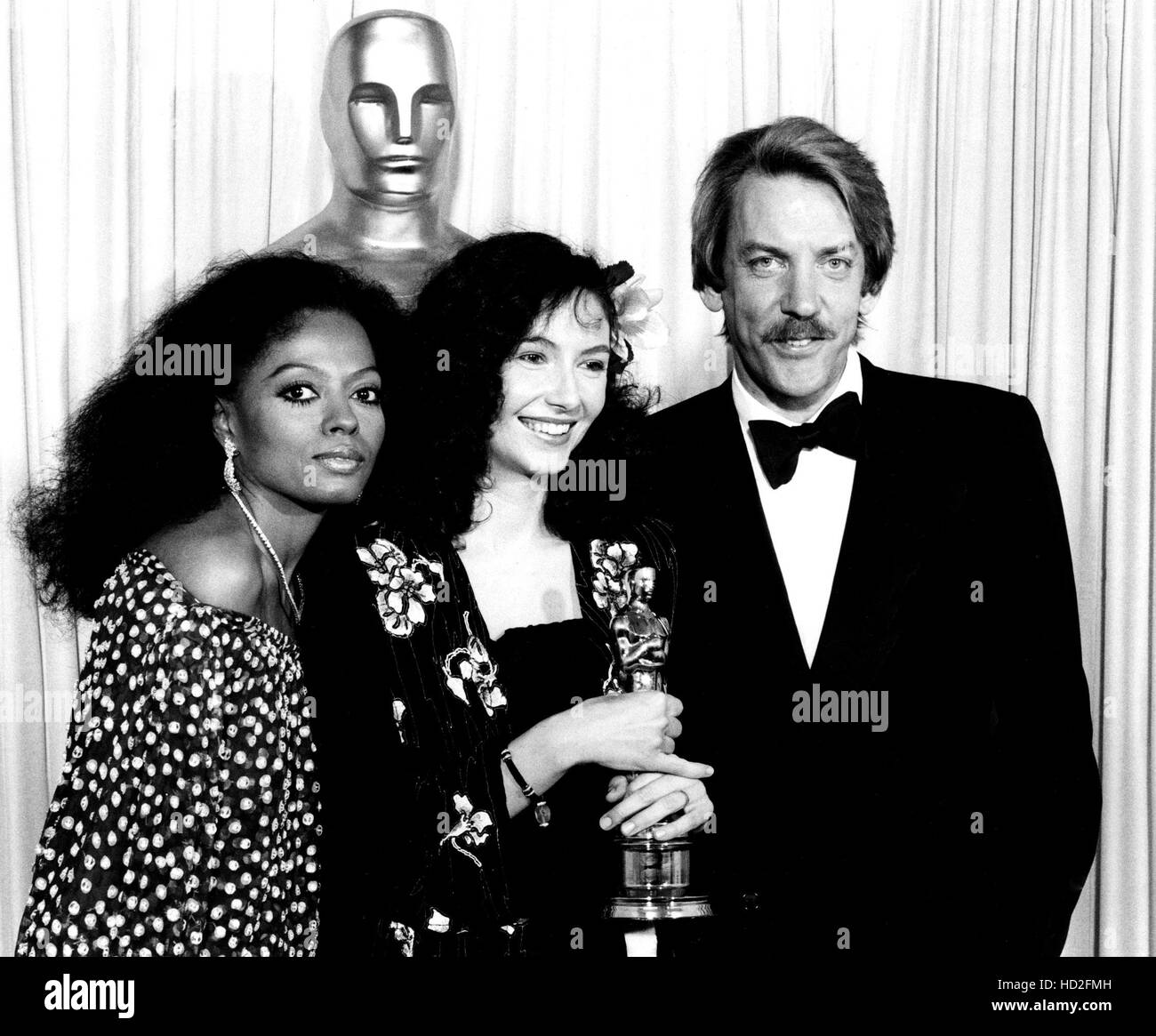 Mary Steenburgen with her Academy Award for MELVIN & HOWARD flanked by Diana Ross and Donald ...