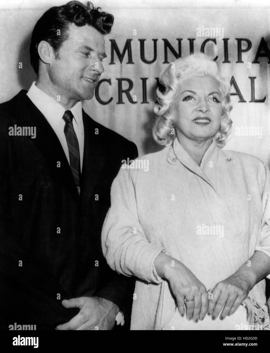 Mae West and Charles 'Chuck' Krauser at end of opening day of trial ...