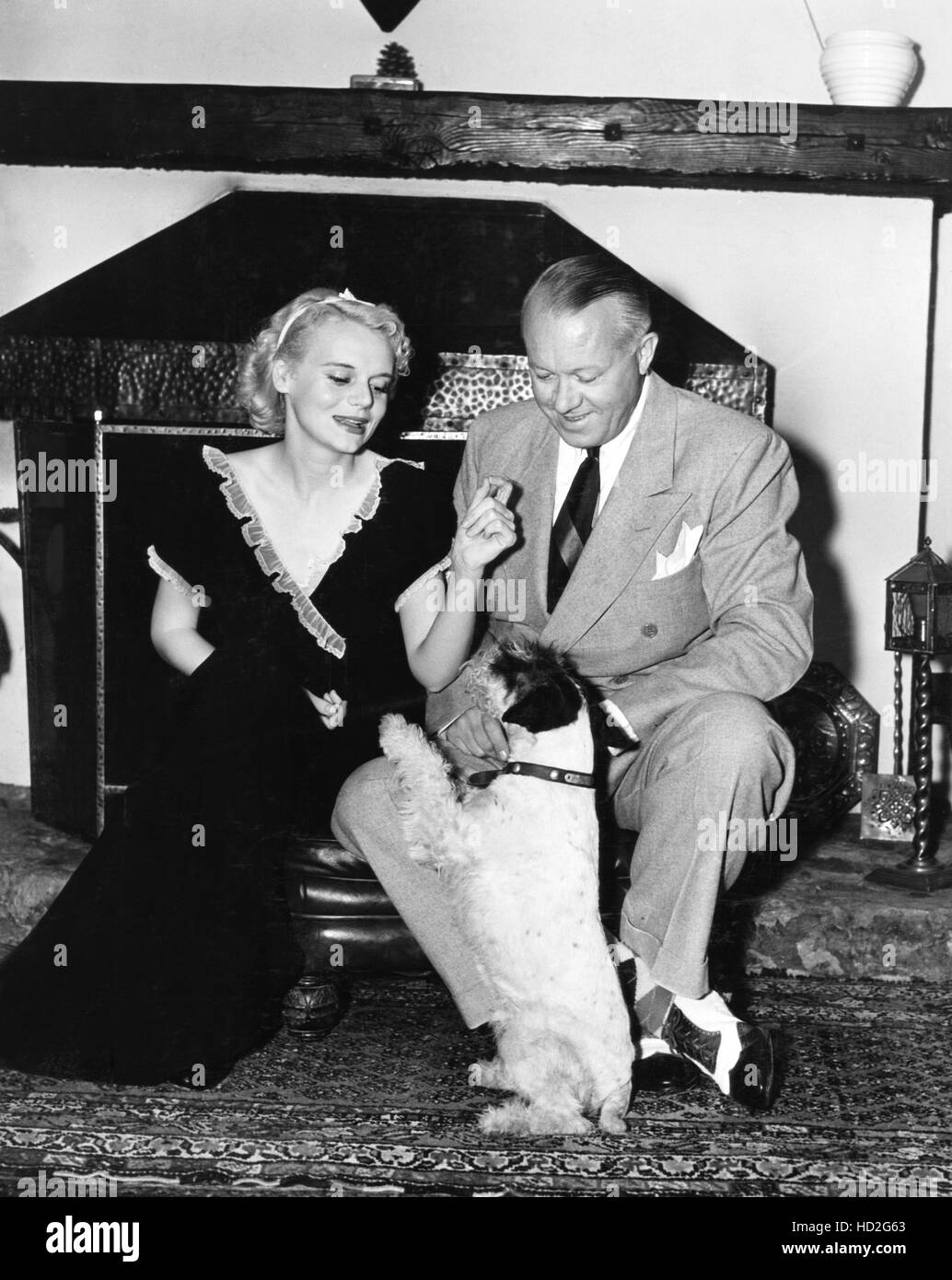 From left: Marie Wilson with husband, Nick Grinde, at home playing with ...