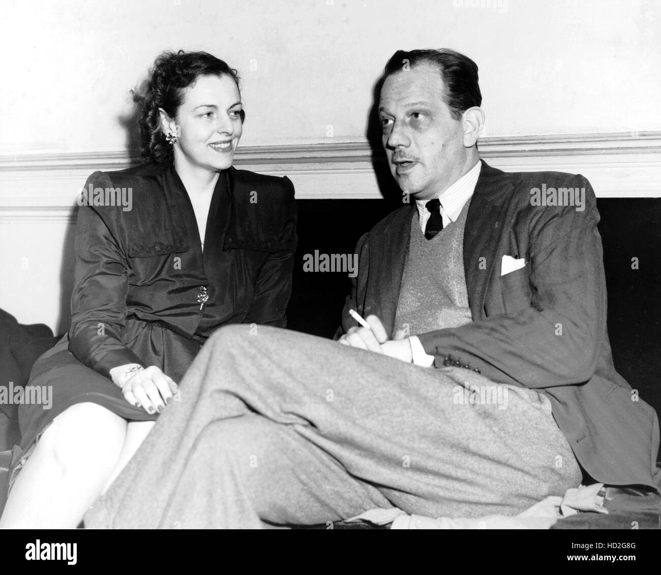 Melvyn Douglas, right, with his second wife, Congresswoman Helen Gahagan, backstage at CALL ME ...