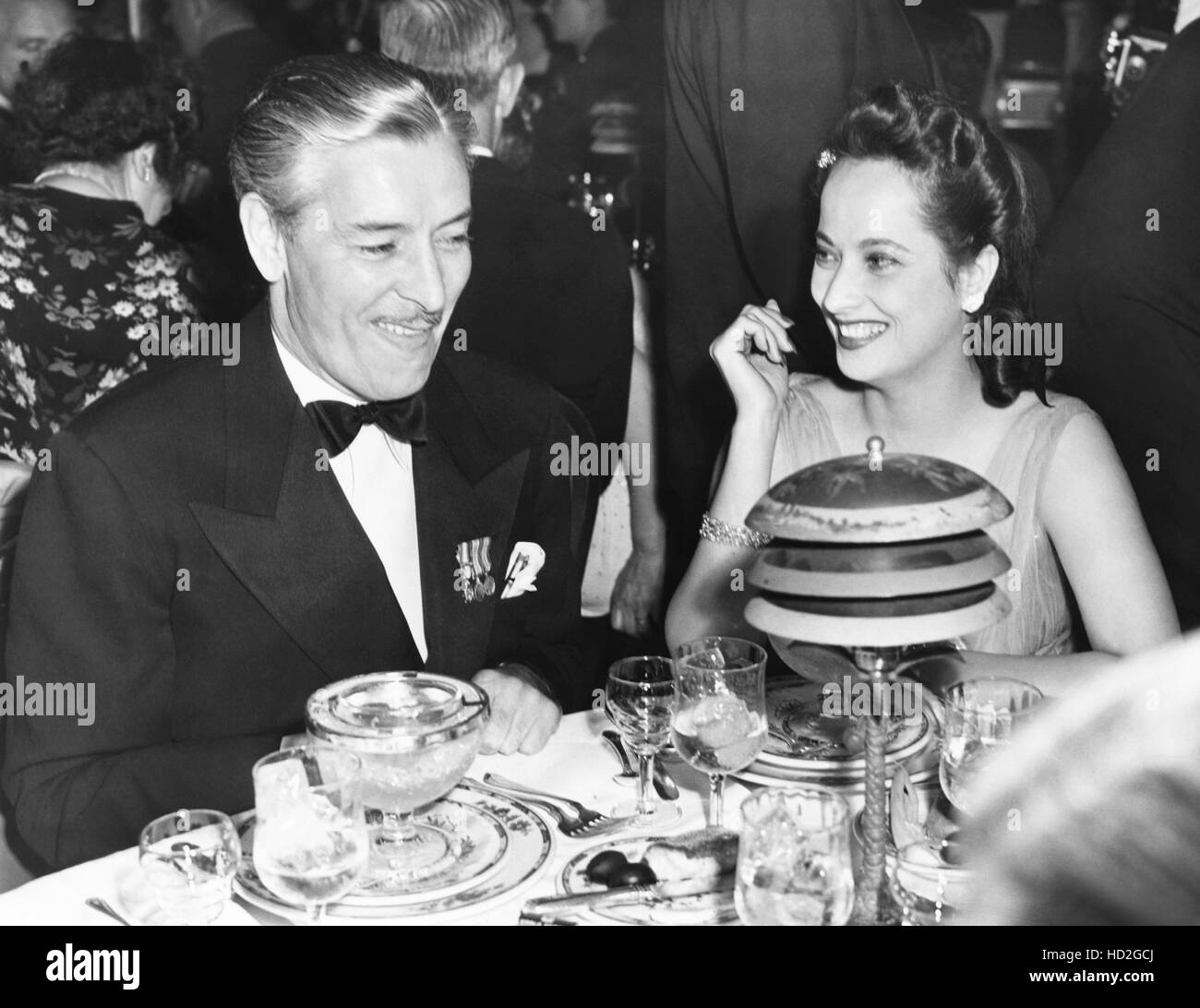 From left: Ronald Colman, Merle Oberon at the War Heroes Party, 1942 ...