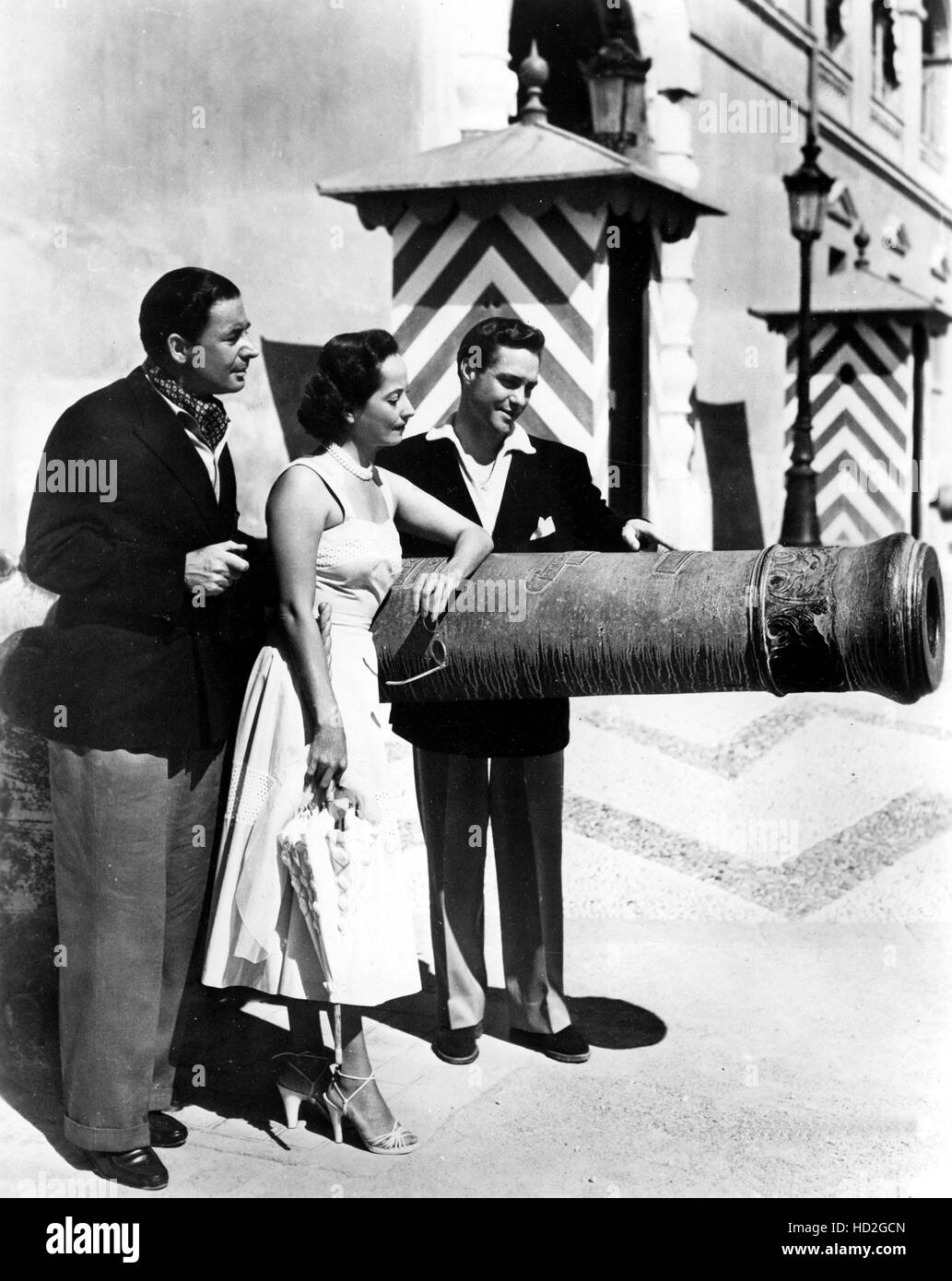 Merle Oberon (center) with Leo Genn (left) and Richard Todd (right ...