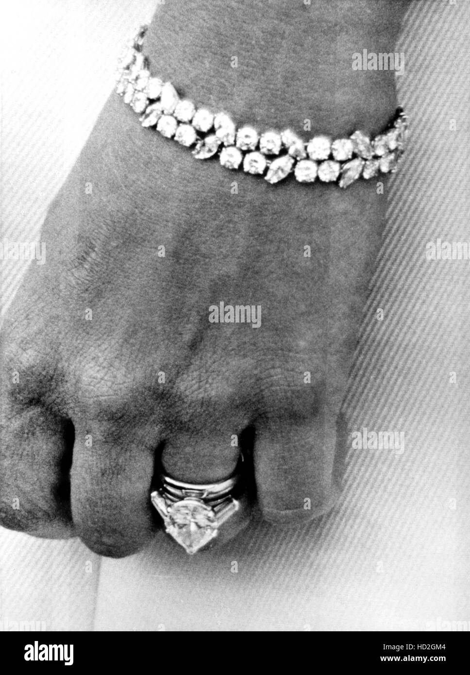 Nine carat diamond engagment ring and gold wedding band on Mrs.Frank ...