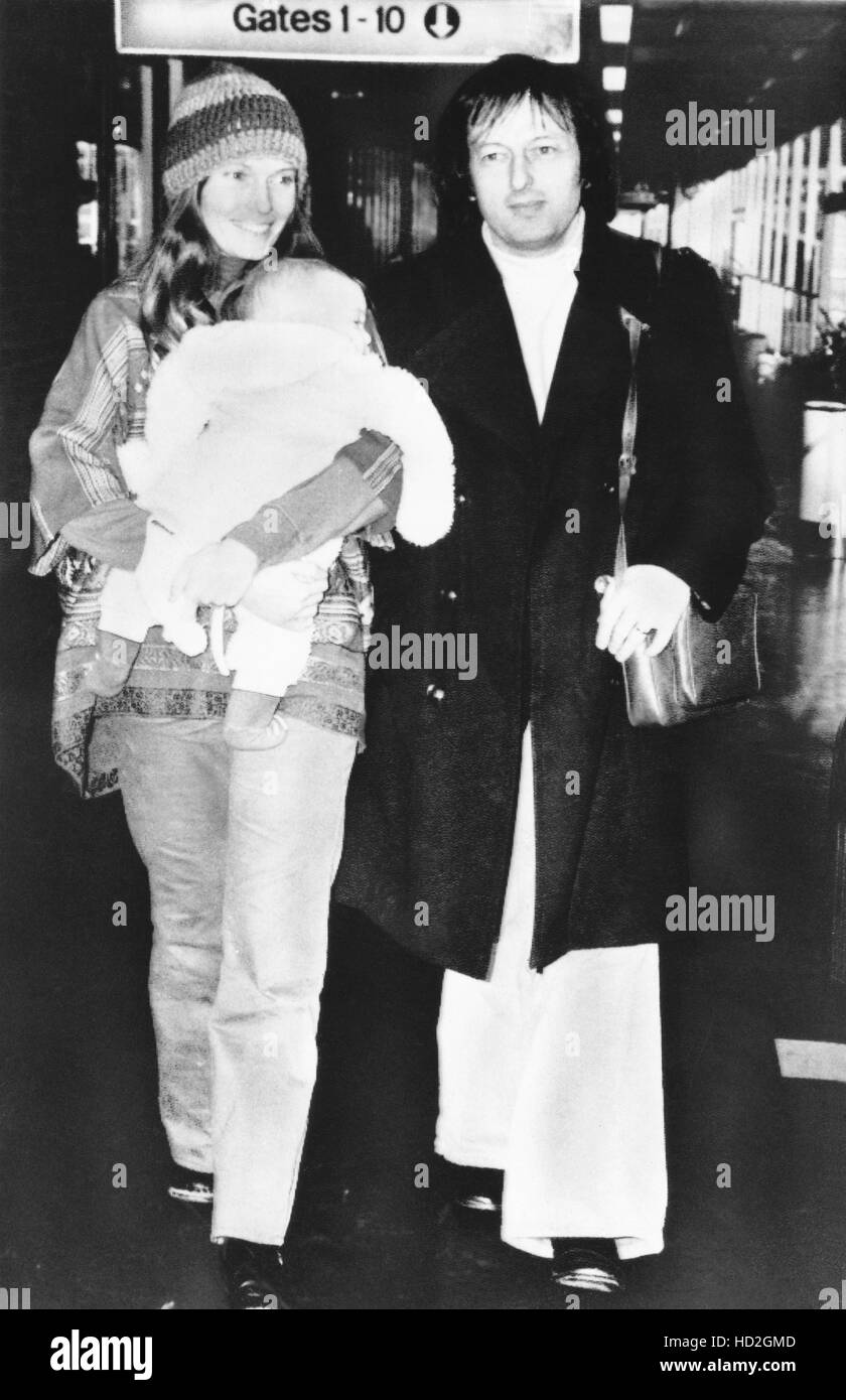 Mia Farrow holding nine month old son Fletcher (left) and Andre Previn ...