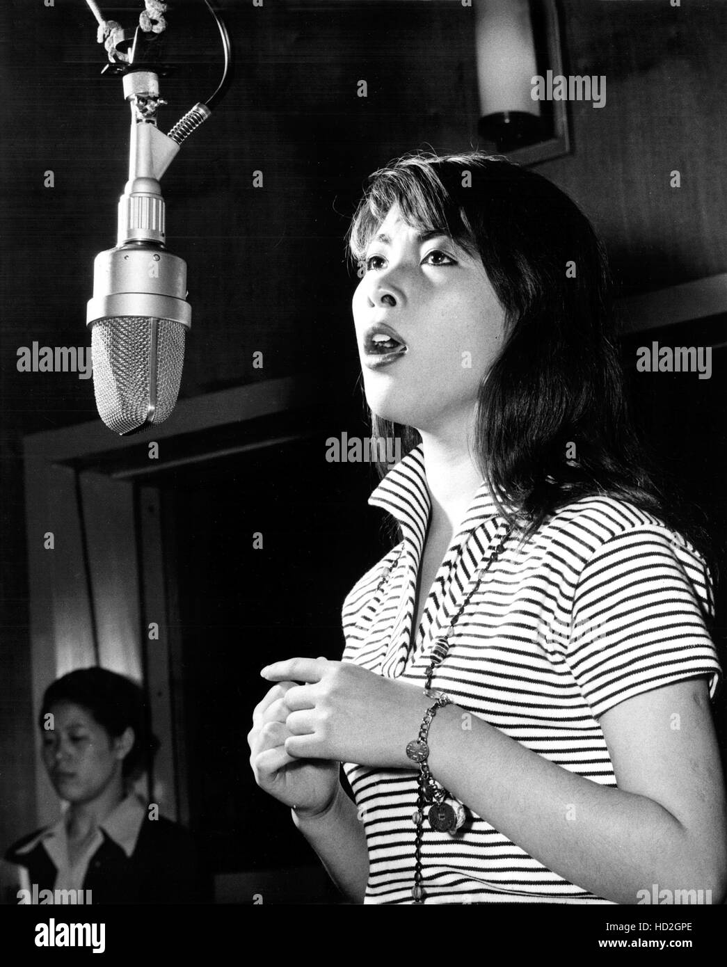 Michiko Hamamura making a record, June 21, 1957 Stock Photo - Alamy