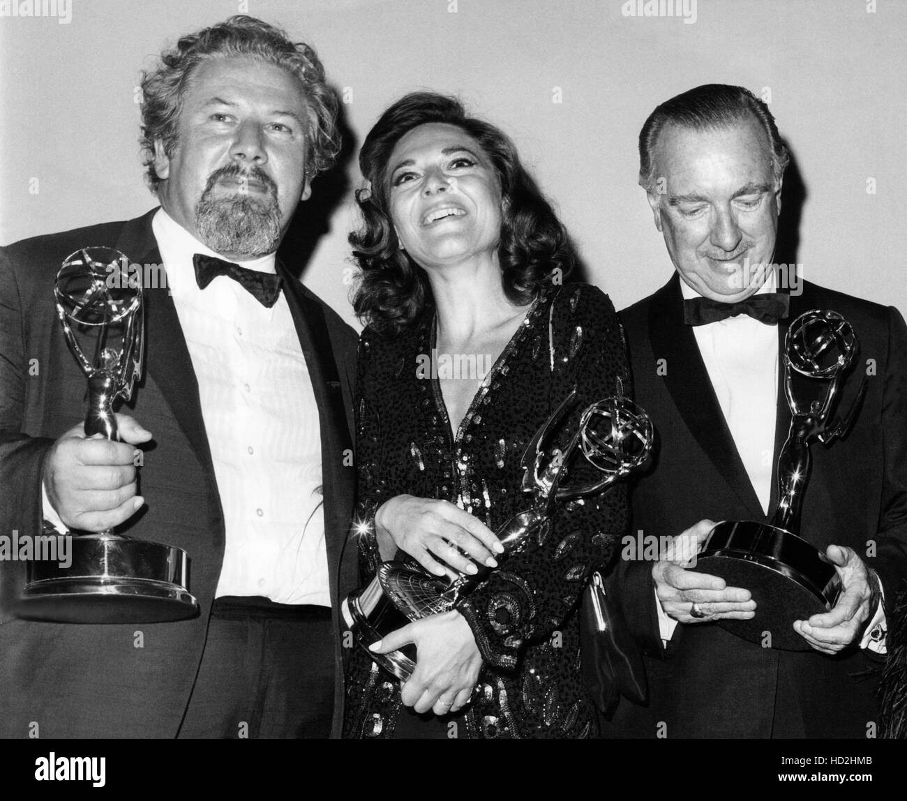Peter Ustinov, Anne Bancroft, Walter Cronkite holding their Emmy Awards ...