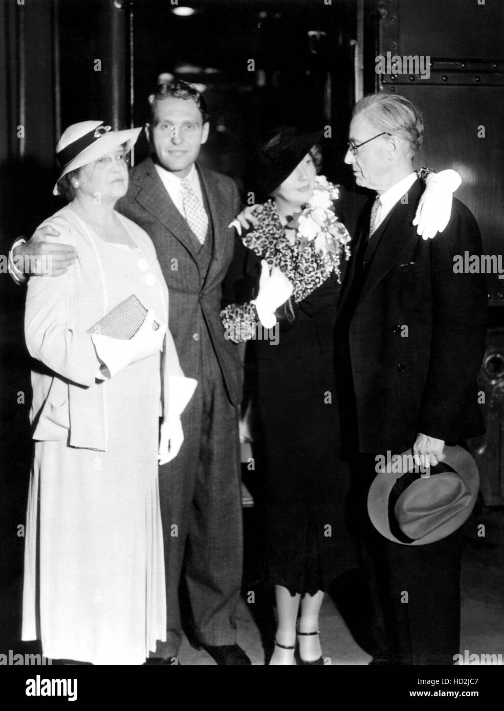 Ralph Bellamy (second left) with his mother, Mrs. Rexford Bellamy (left ...