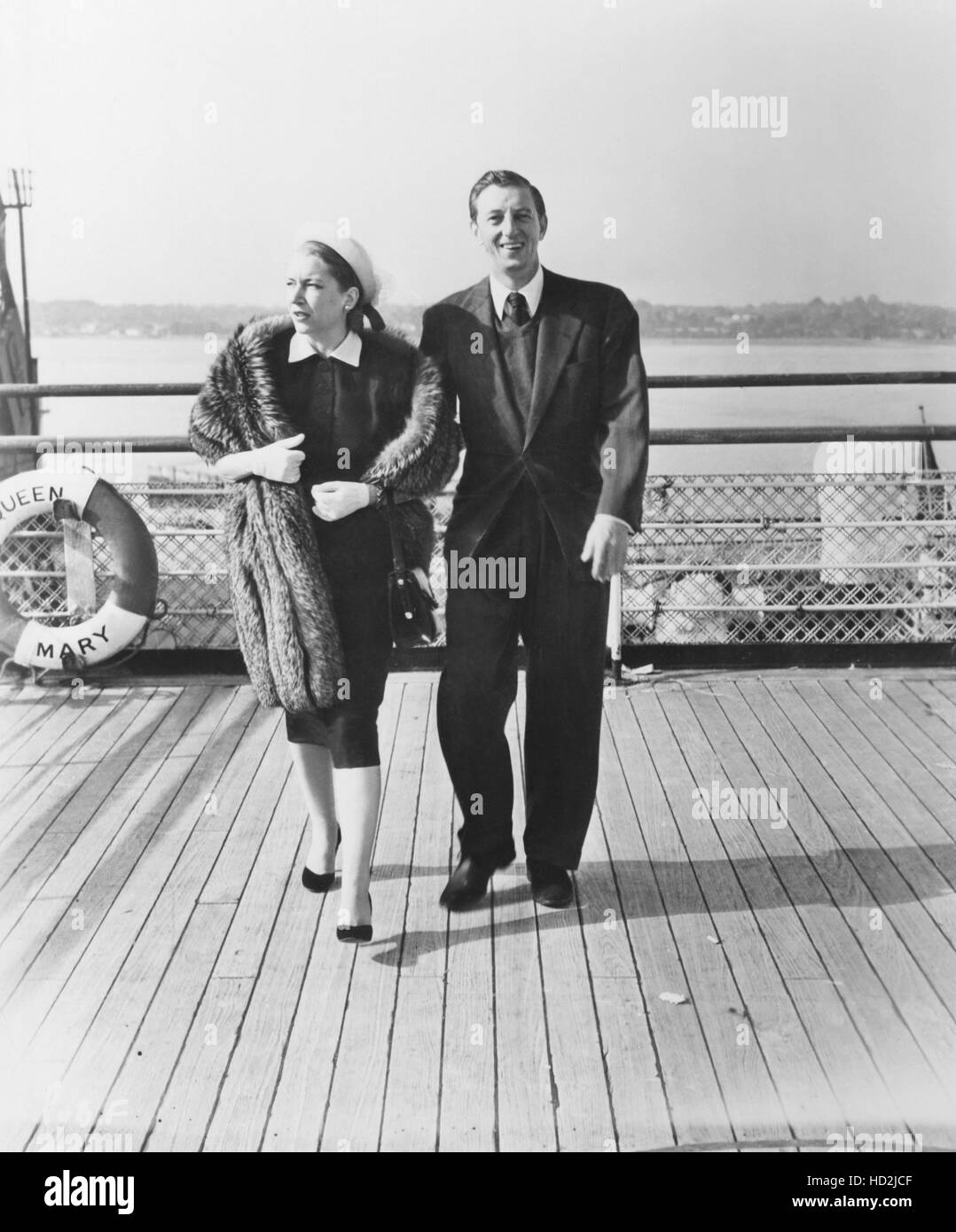 Ray Bolger (right) and his wife Gwendolyn Bolger arriving in england ...