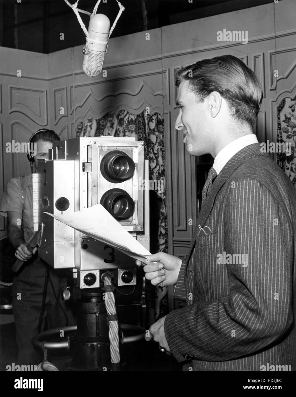 Announcer Ray Forrest performing for the early experimental television ...