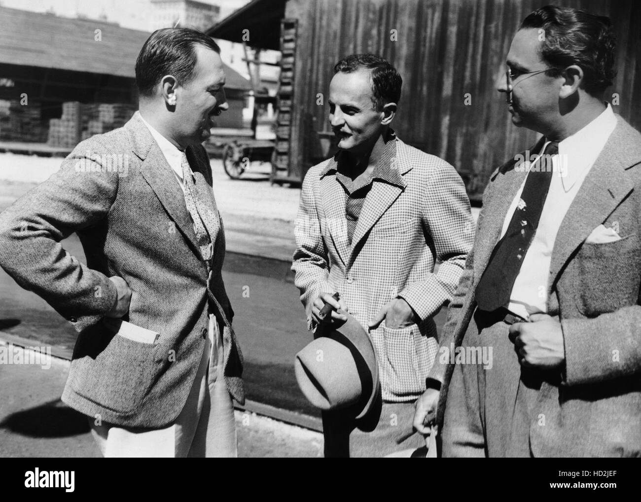 From left: Raymond Griffith, Darryl F. Zanuck, William Goetz, August 1934 Stock Photo - Alamy