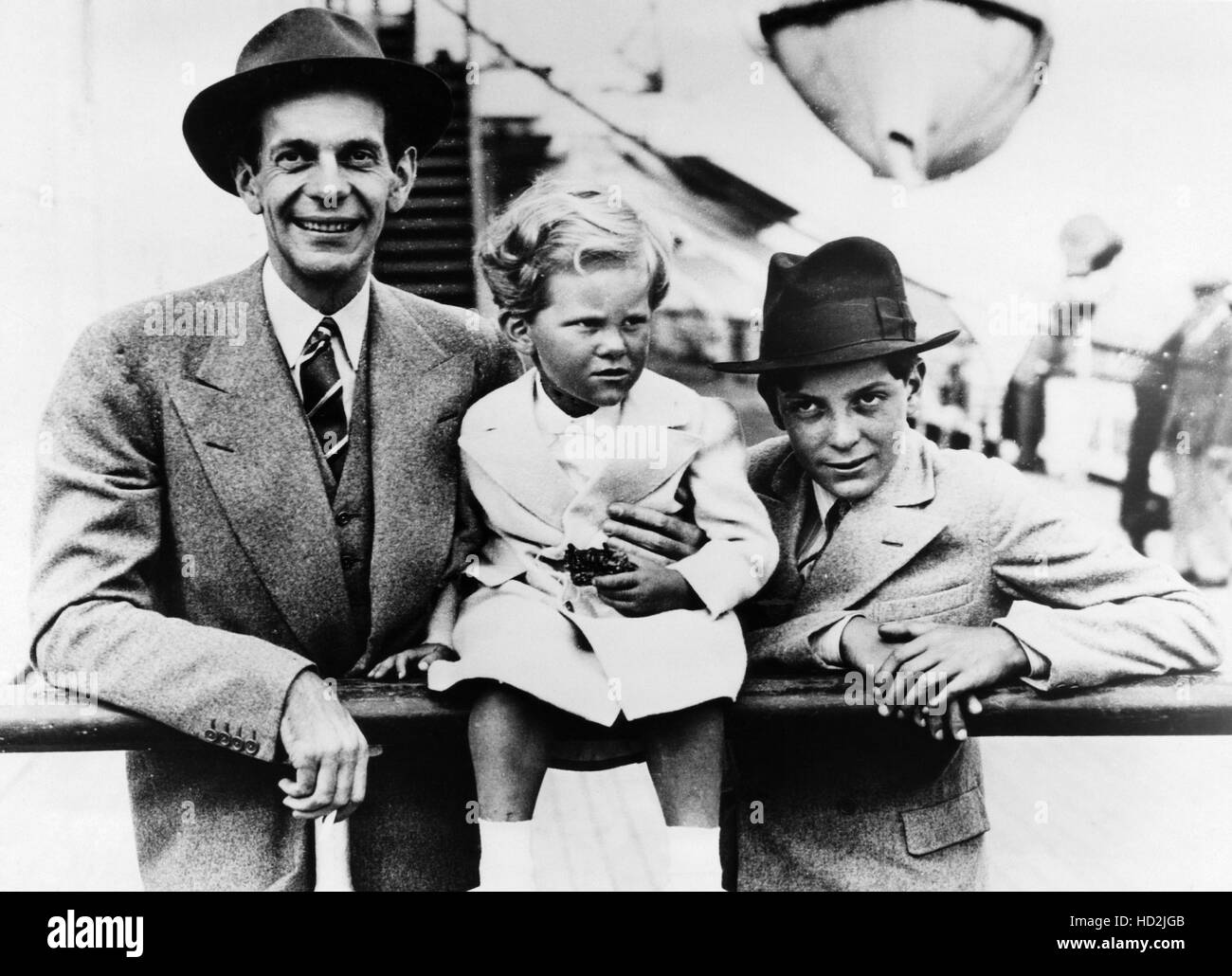 From left: Raymond Massey with sons, Daniel and Jeffrey, arriving in ...