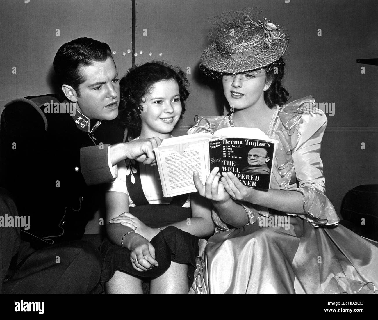 Shirley Temple (center) visiting Robert Cummings, Deanna Durbin on the ...
